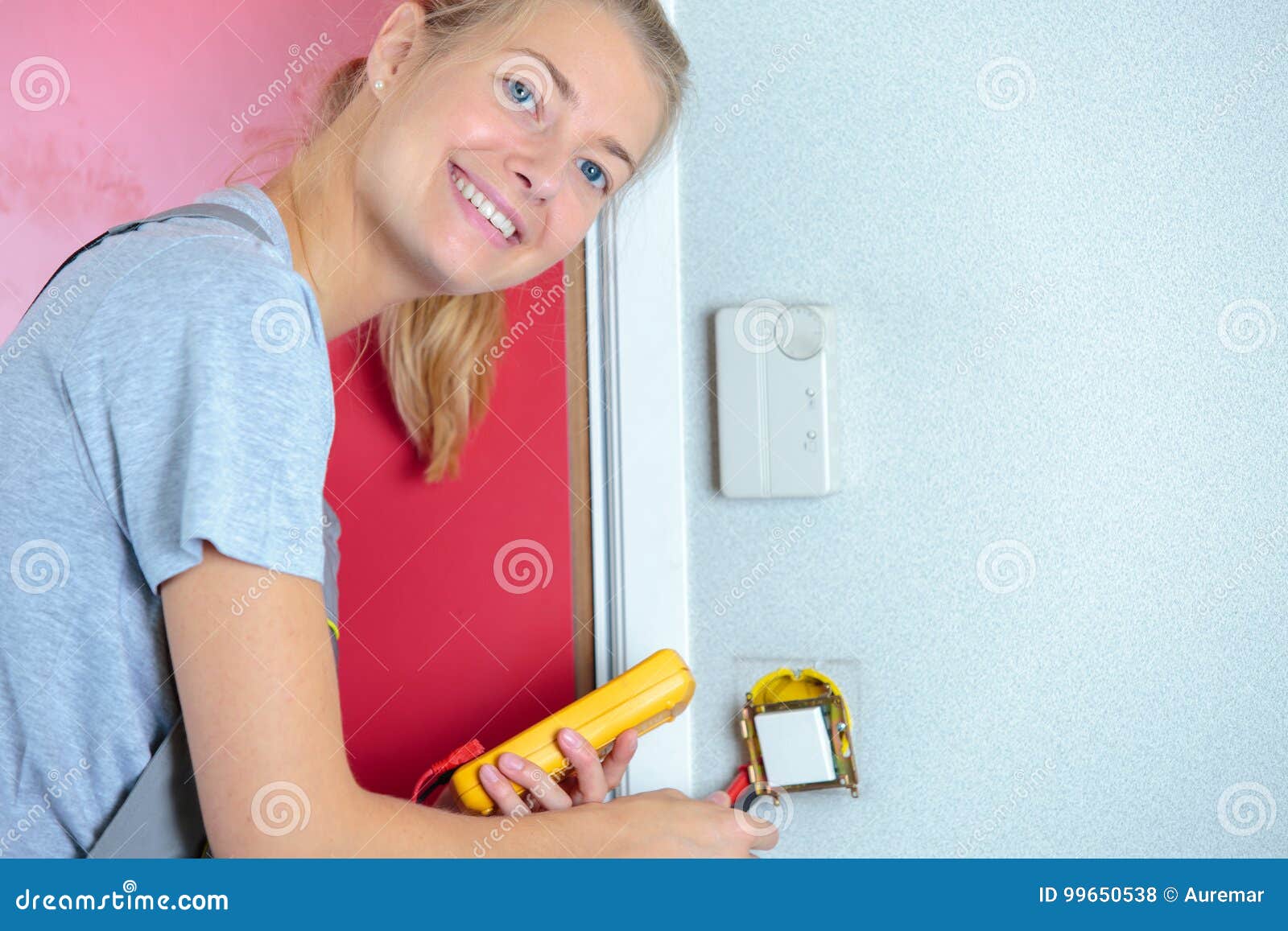 Female Electrician Installing Wall Socket Stock Photo - Image of person ...