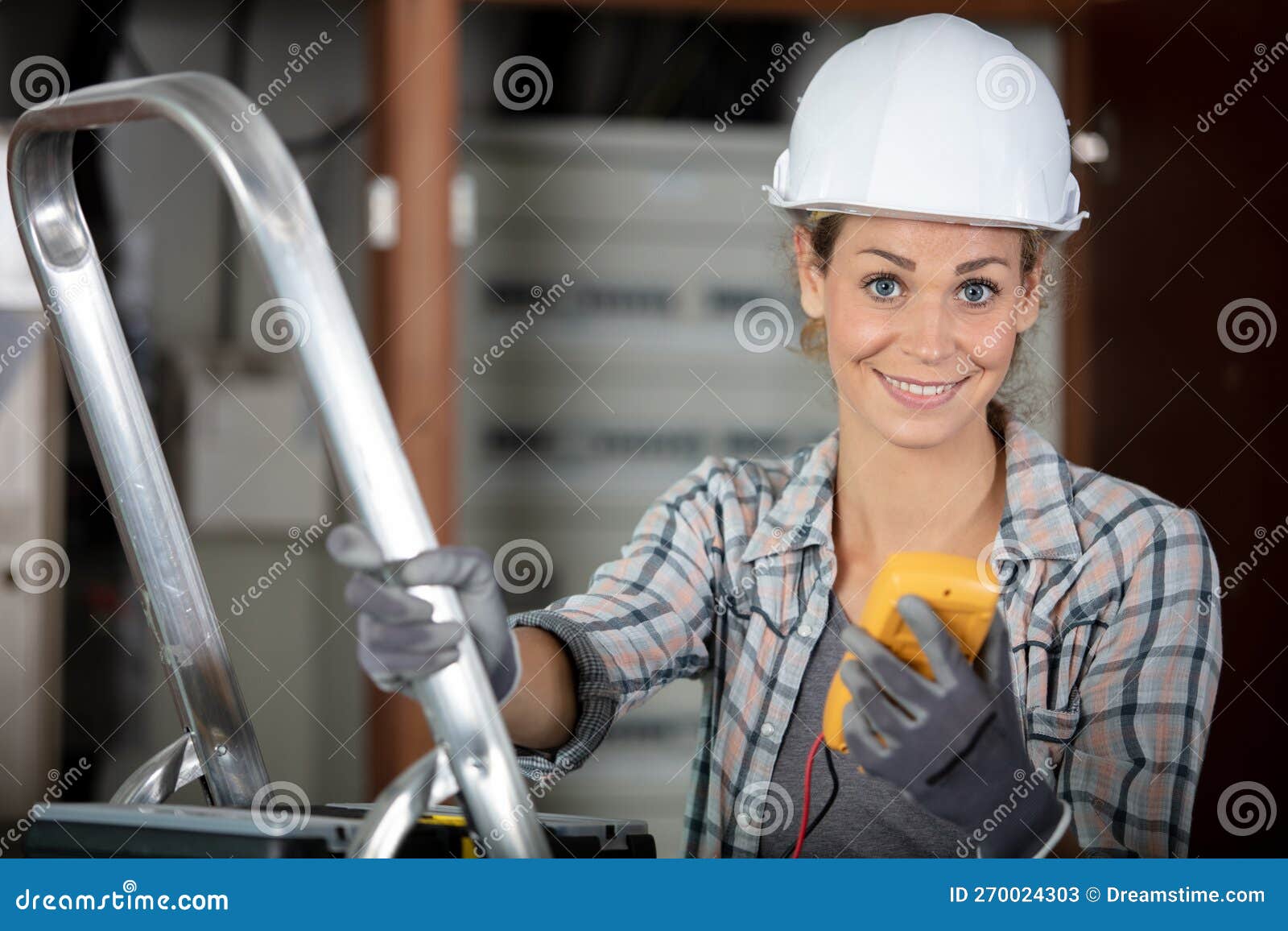 Female Electrician Taking Multimeter Reading from Vintage Meter Stock ...