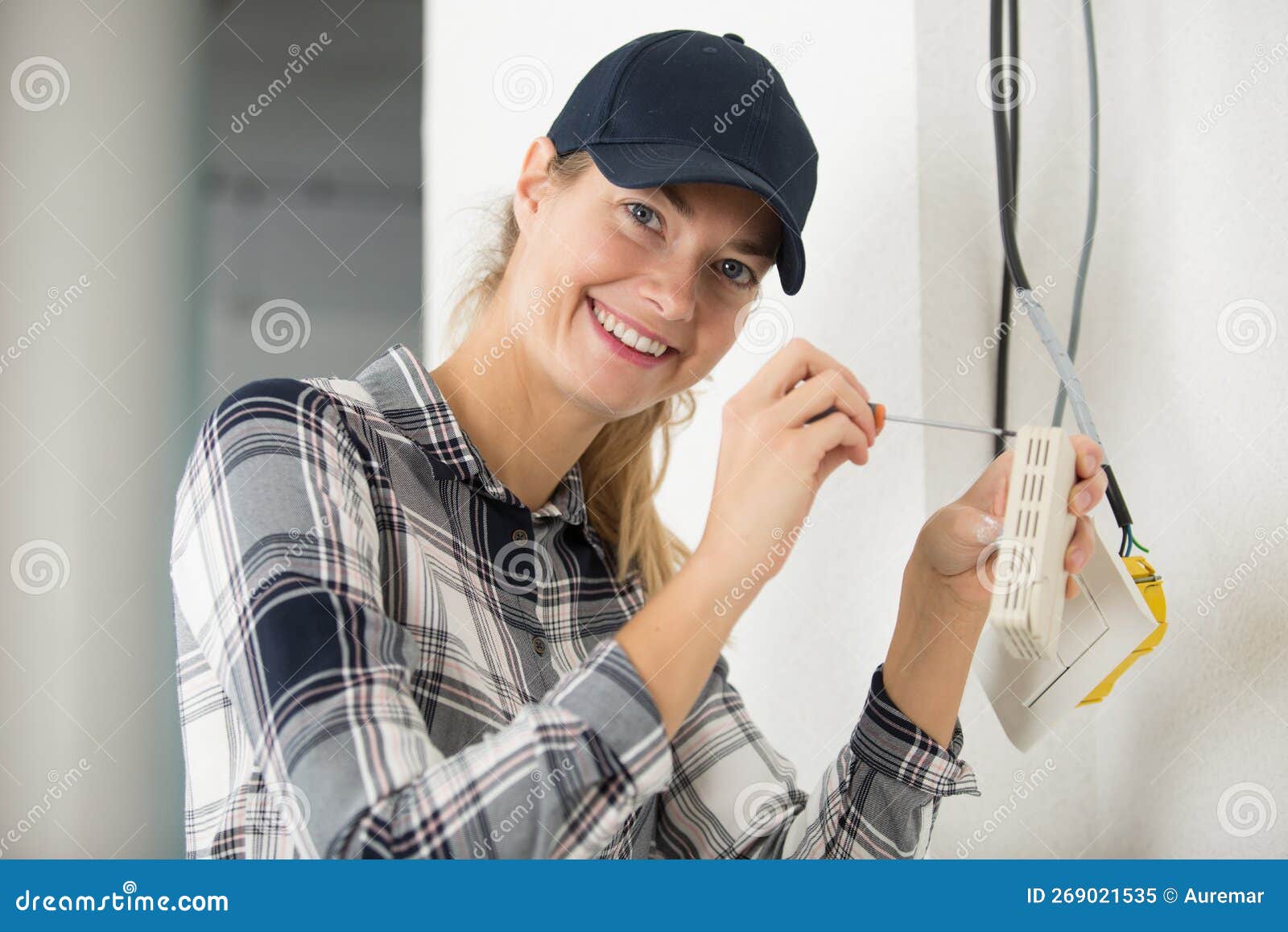 Female Electrician Wiring in Components Stock Image - Image of ...