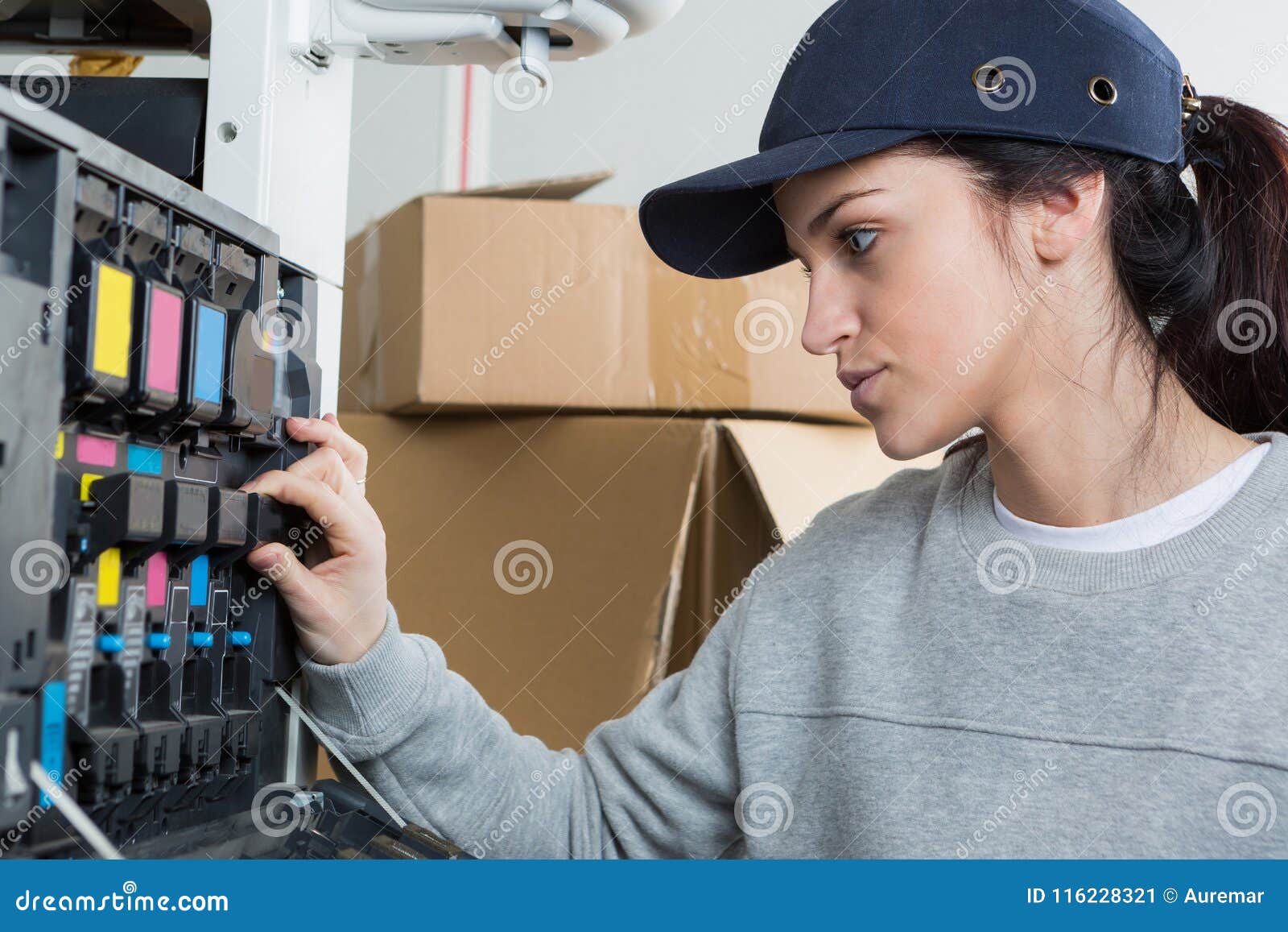 Female electrician at work stock image. Image of builder - 116228321