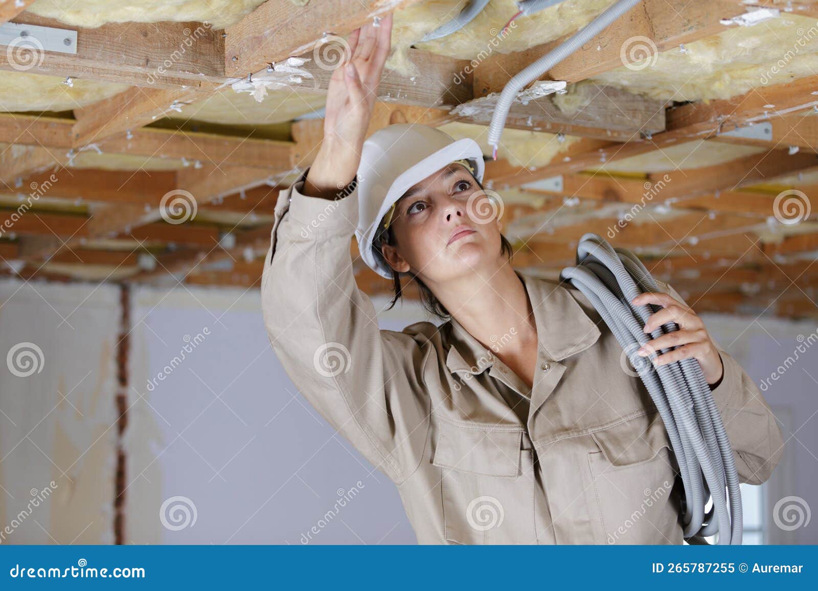 Female electrician at work stock image. Image of manually - 265787255