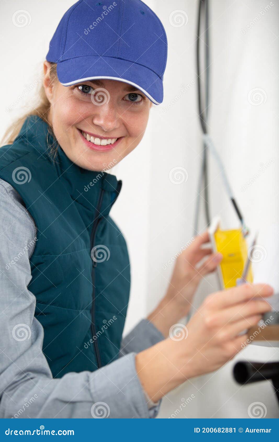 Female Electrician at Work with Wire Stock Image - Image of technology ...