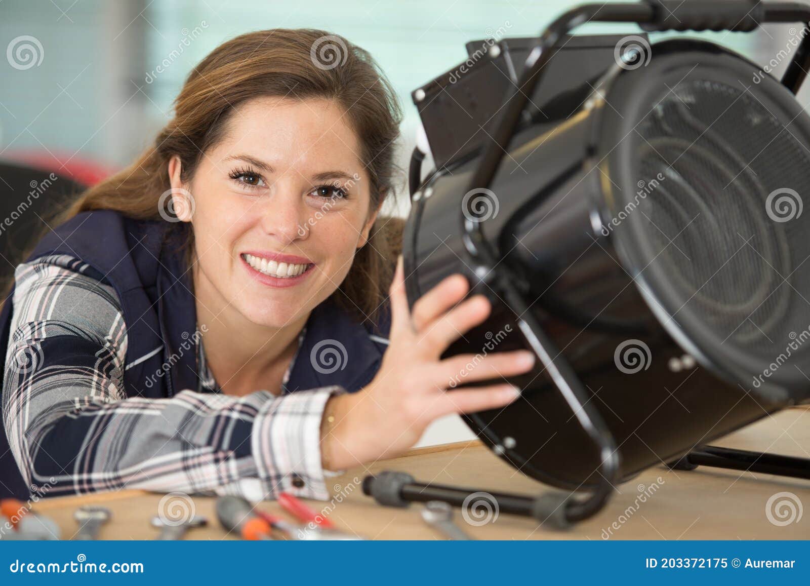 Female Electrician Working on Appliance Stock Image - Image of ...