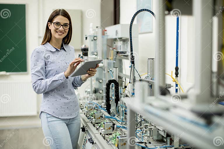 Female Electronic Engineer Using Digital Tablet in the Laboratory Stock ...