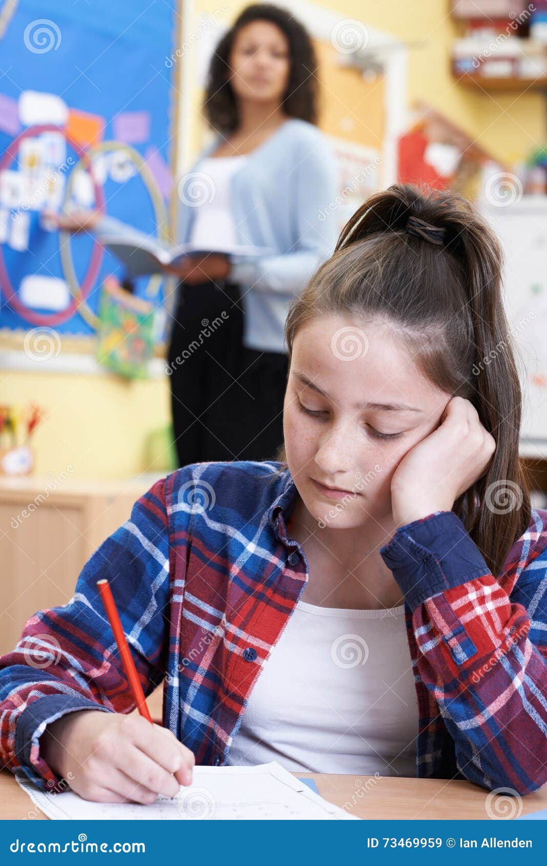 School Boy Struggling To Finish Test In Class. Royalty-Free Stock Photo ...