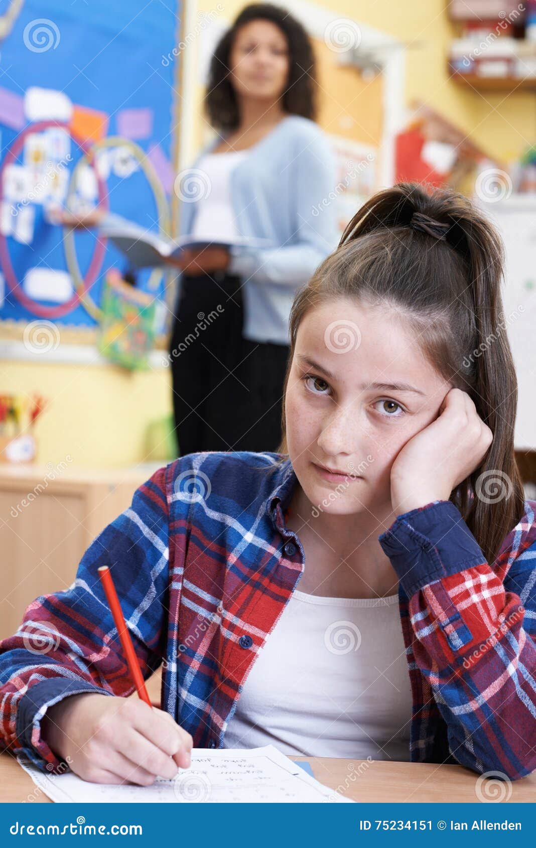 School Boy Struggling To Finish Test In Class. Royalty-Free Stock Photo ...