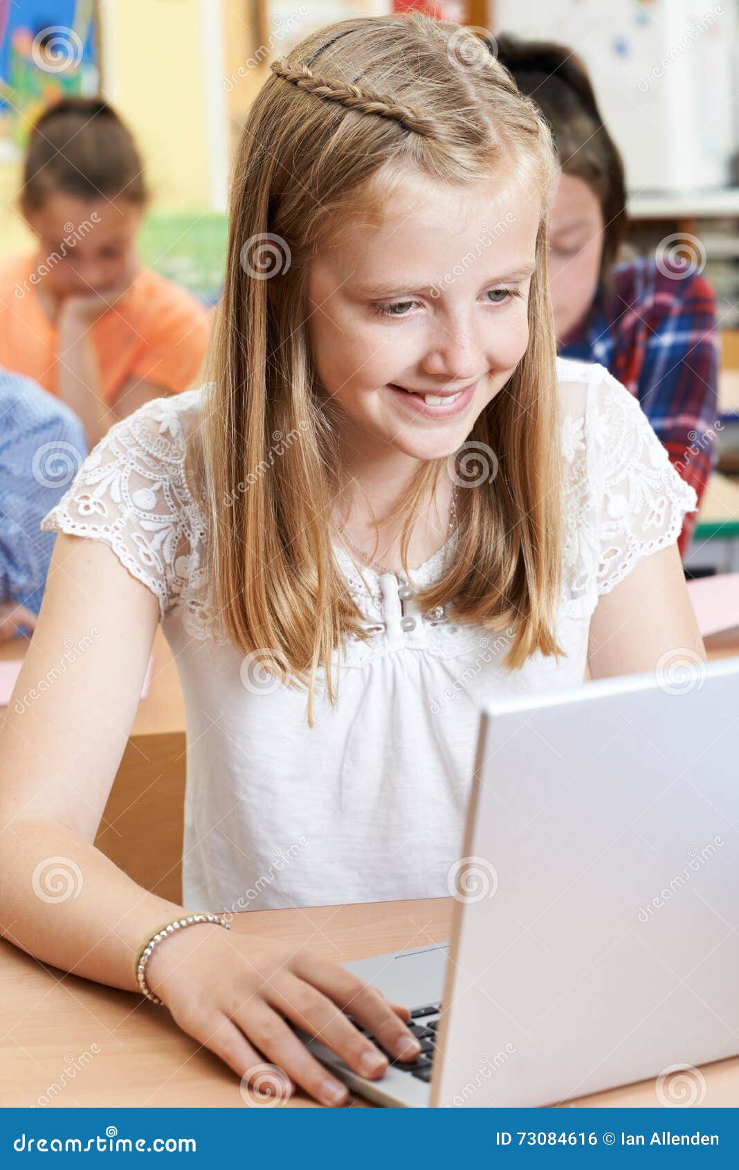 Female Elementary School Pupil Using Laptop in Computer Class Stock ...