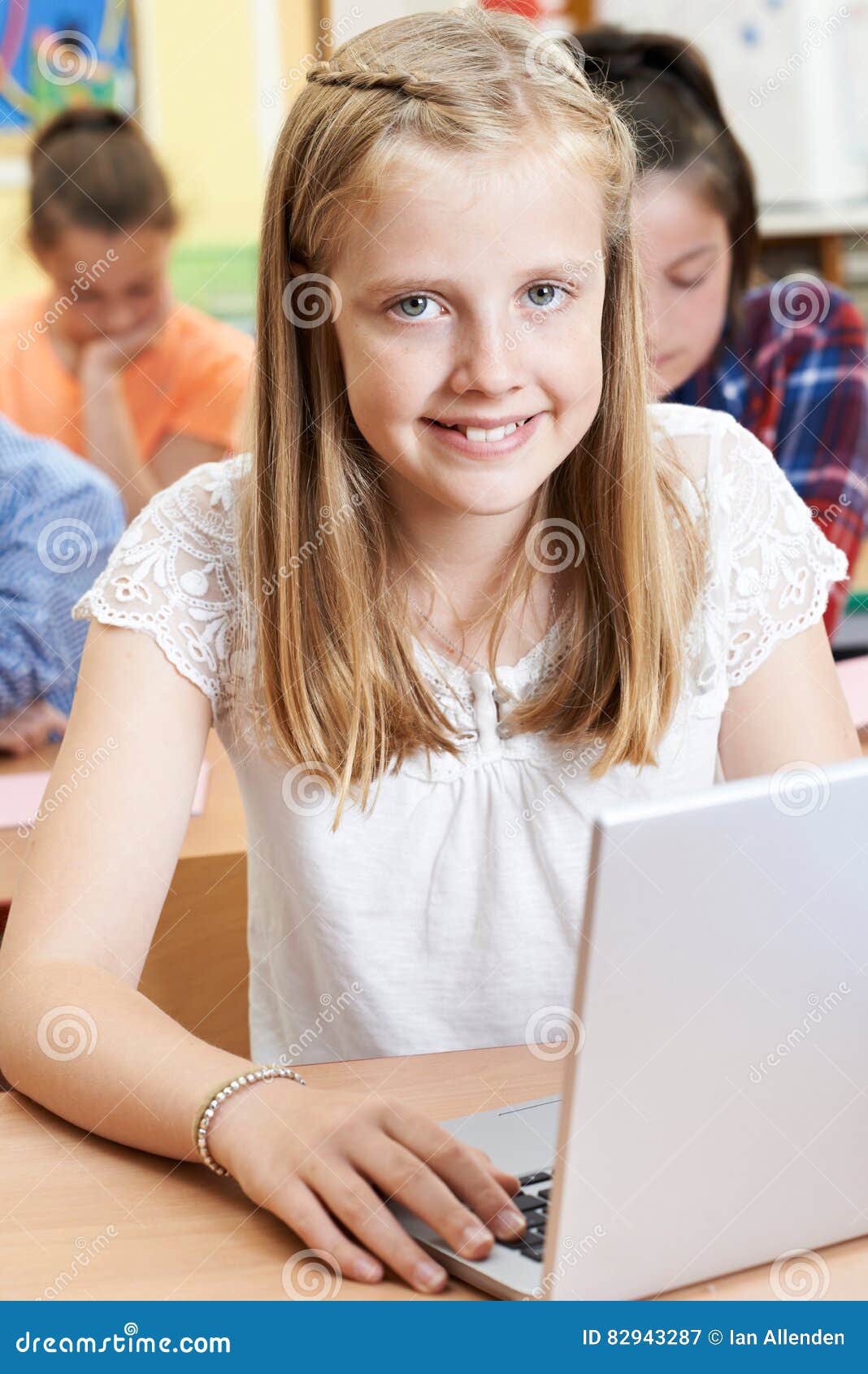 Female Elementary School Pupil Using Laptop in Computer Class Stock ...