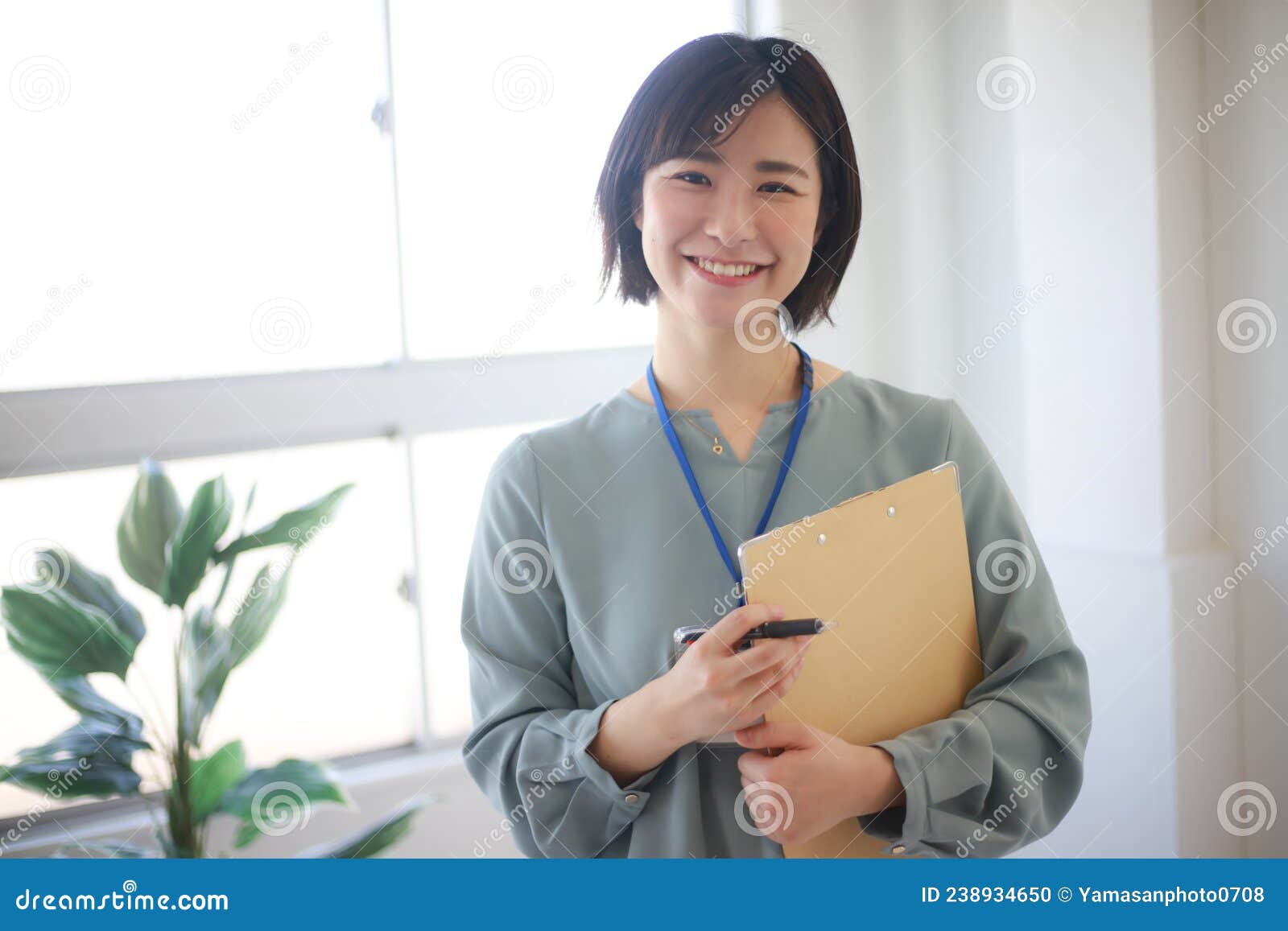 Female Employee with a Binder Stock Photo - Image of dress, hair: 238934650