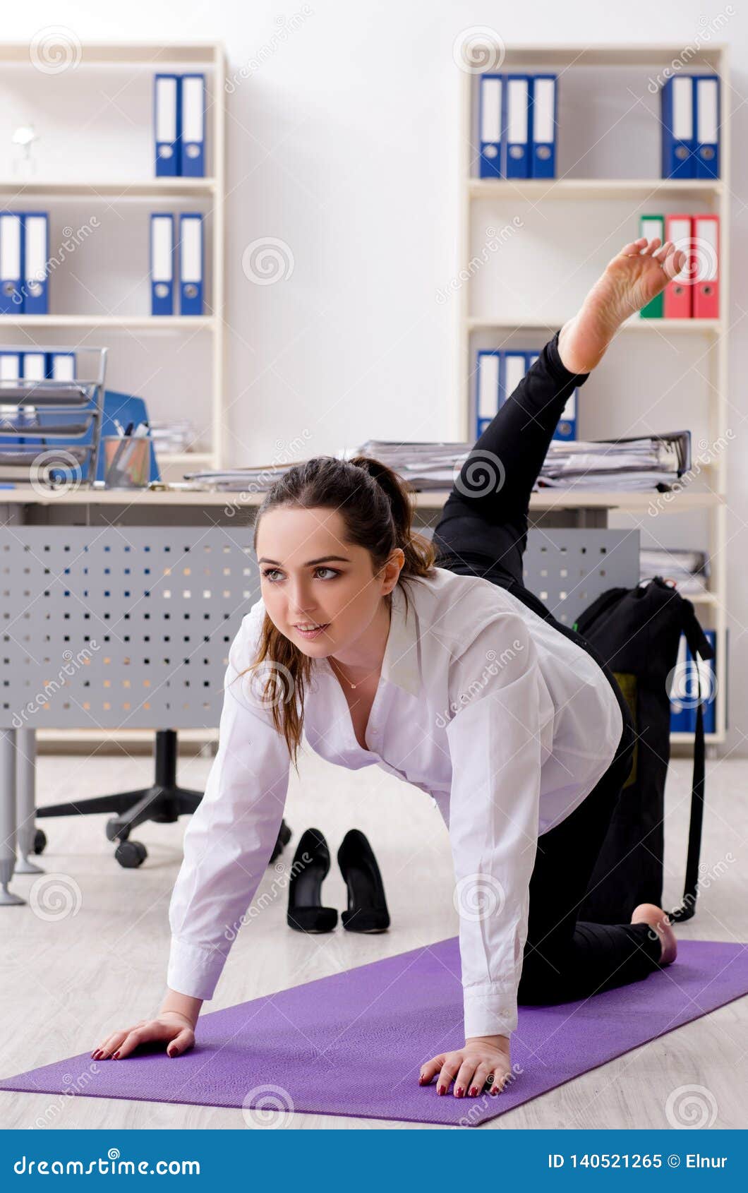 The Female Employee Doing Sport Exercises in the Office Stock Image ...