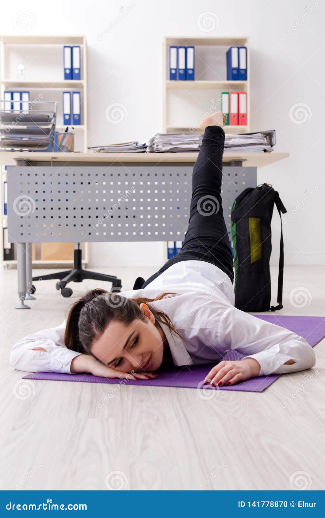 The Female Employee Doing Sport Exercises in the Office Stock Photo ...