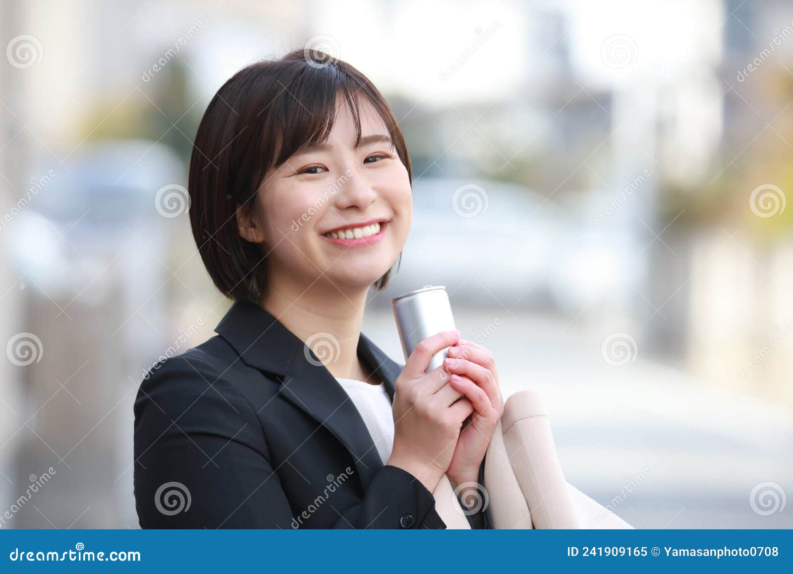 Female Employee Drinking a Drink Stock Image - Image of sunny, girl ...