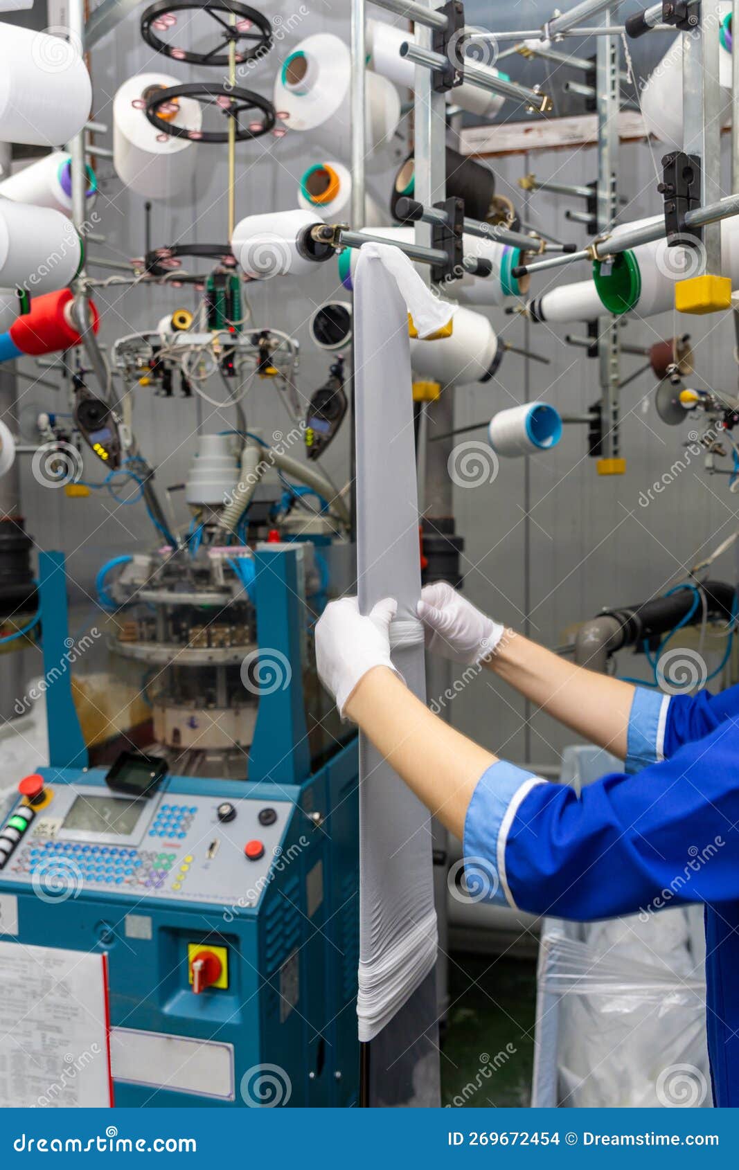 A Female Employee Performs Visual Quality Control of Hosiery Stock ...
