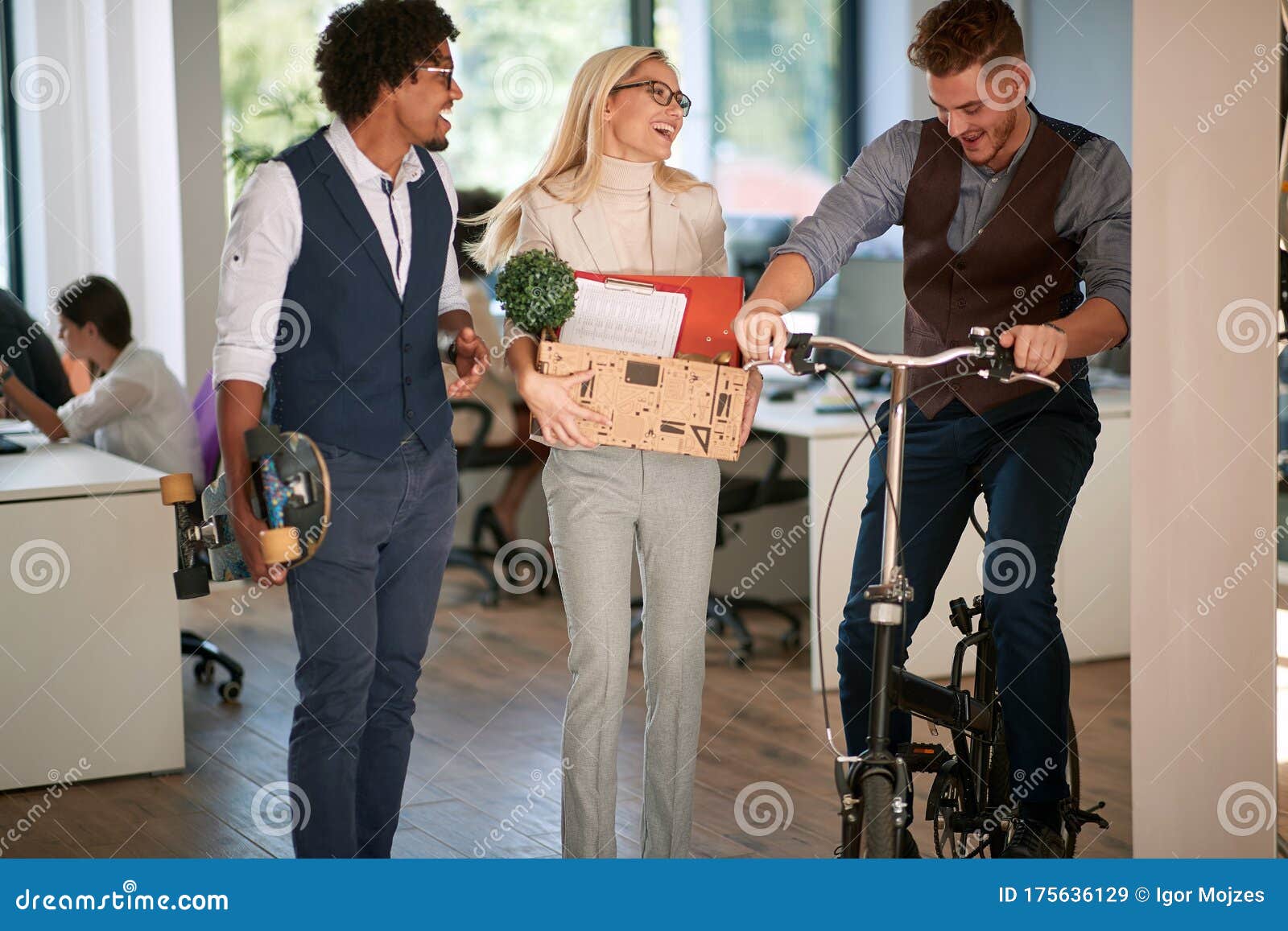 Female Employee with Personal Stuff and Colleagues at Office Stock ...