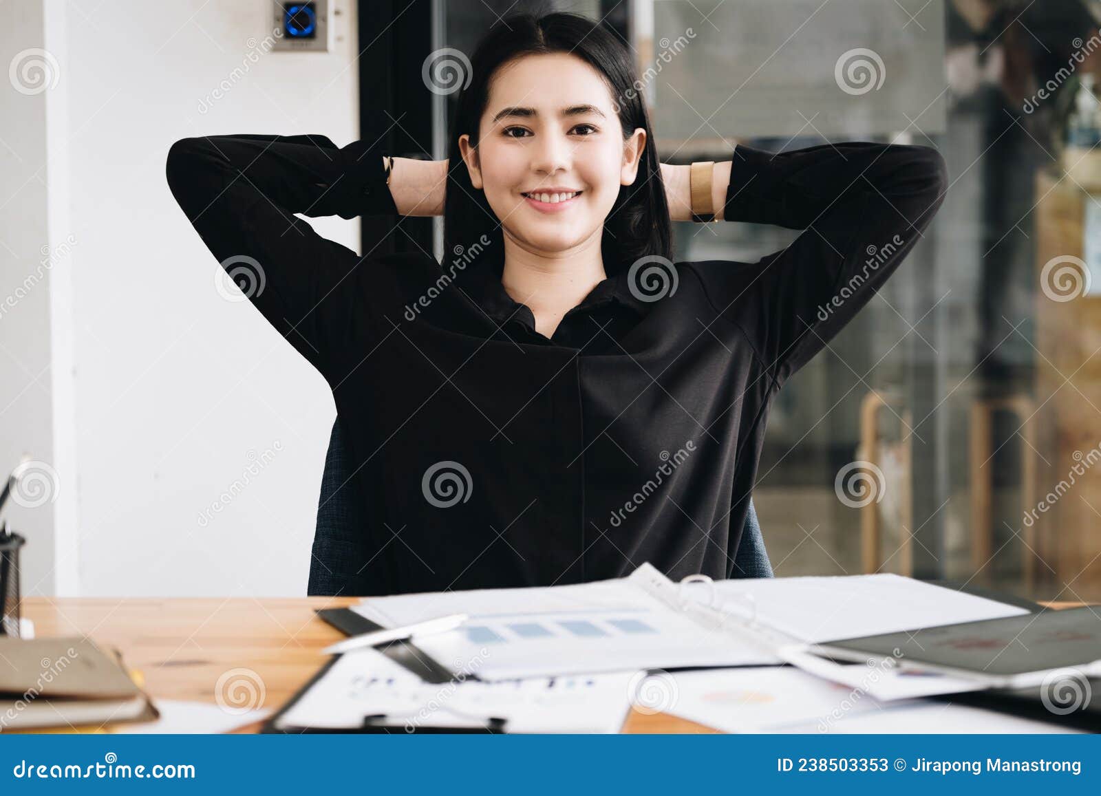The Female Employee Shows a Smiley Face after Completing the Task at ...