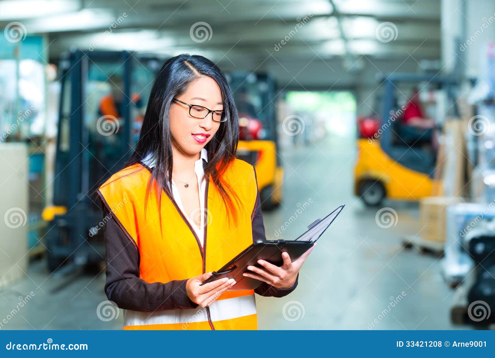 Female Employee or Supervisor at Warehouse Stock Photo - Image of ...