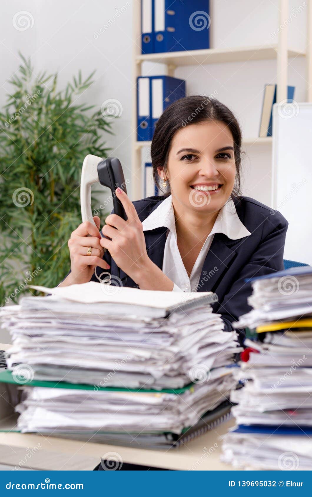 The Female Employee with Too Much Work in the Office Stock Photo ...