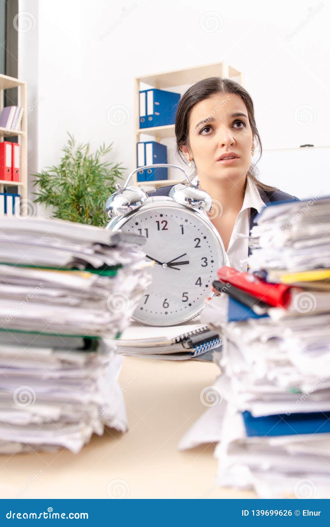 The Female Employee with Too Much Work in the Office Stock Photo ...