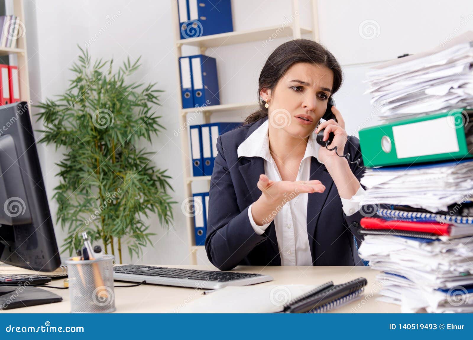The Female Employee with Too Much Work in the Office Stock Image ...