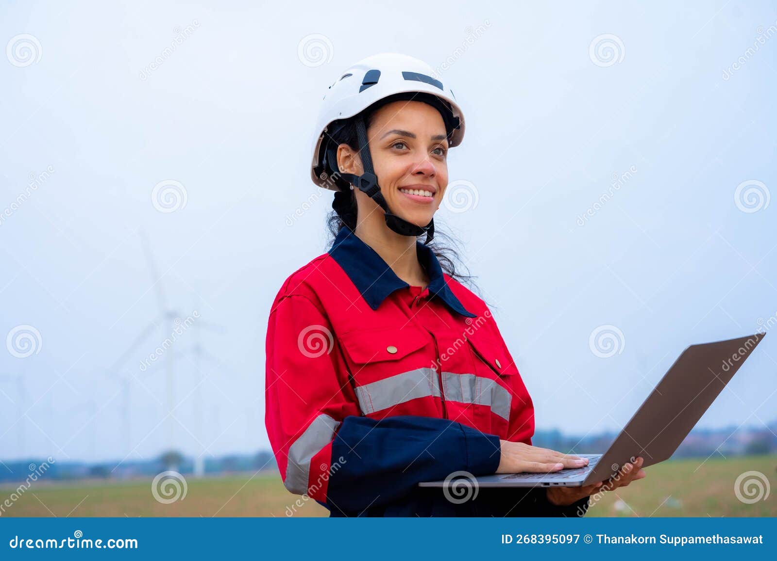 Female Engineer or Architect Stands Outdoors with Laptop To Work ...