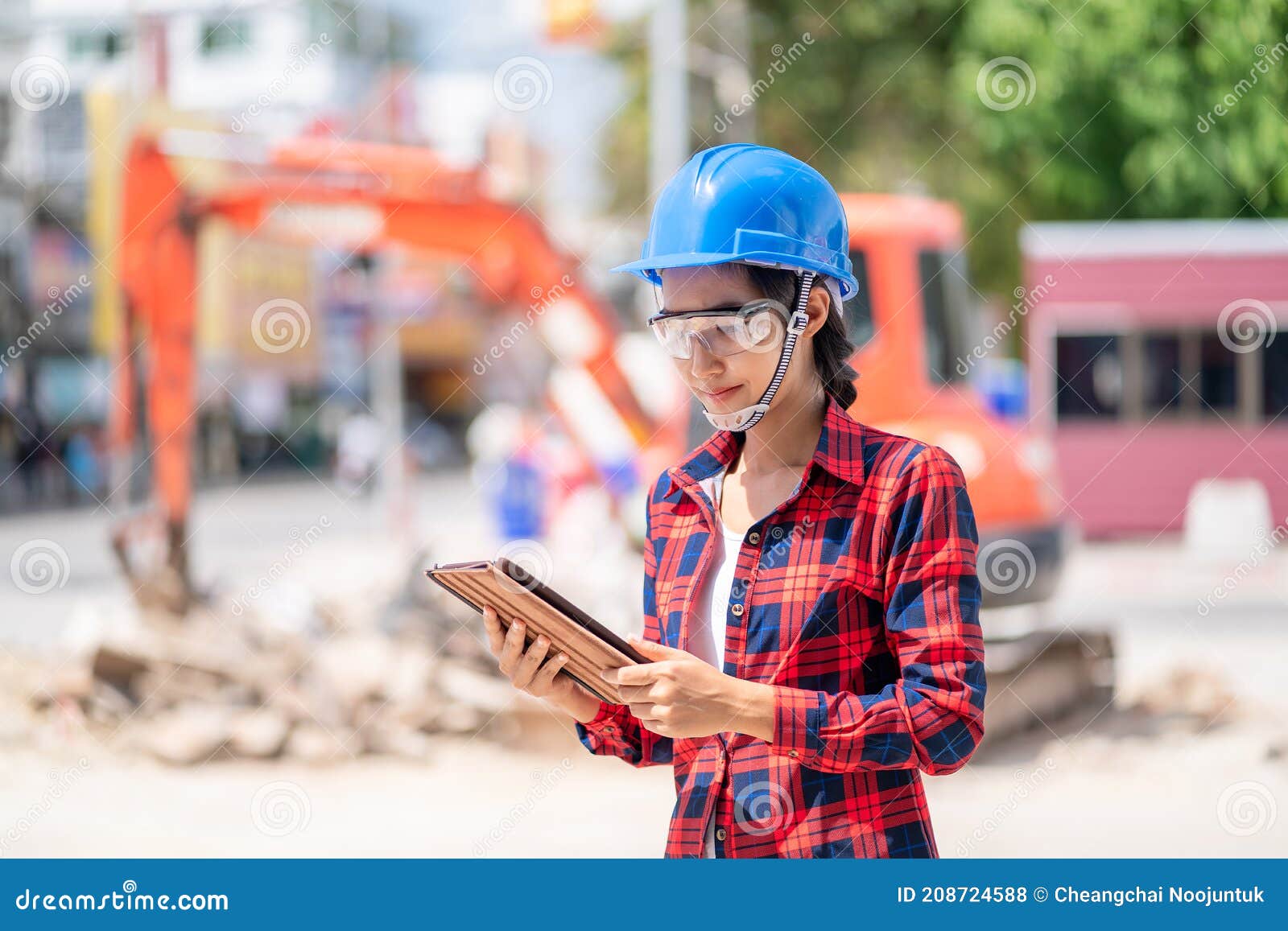 Female Engineer is Inspecting Work at the Construction Site Stock Photo ...