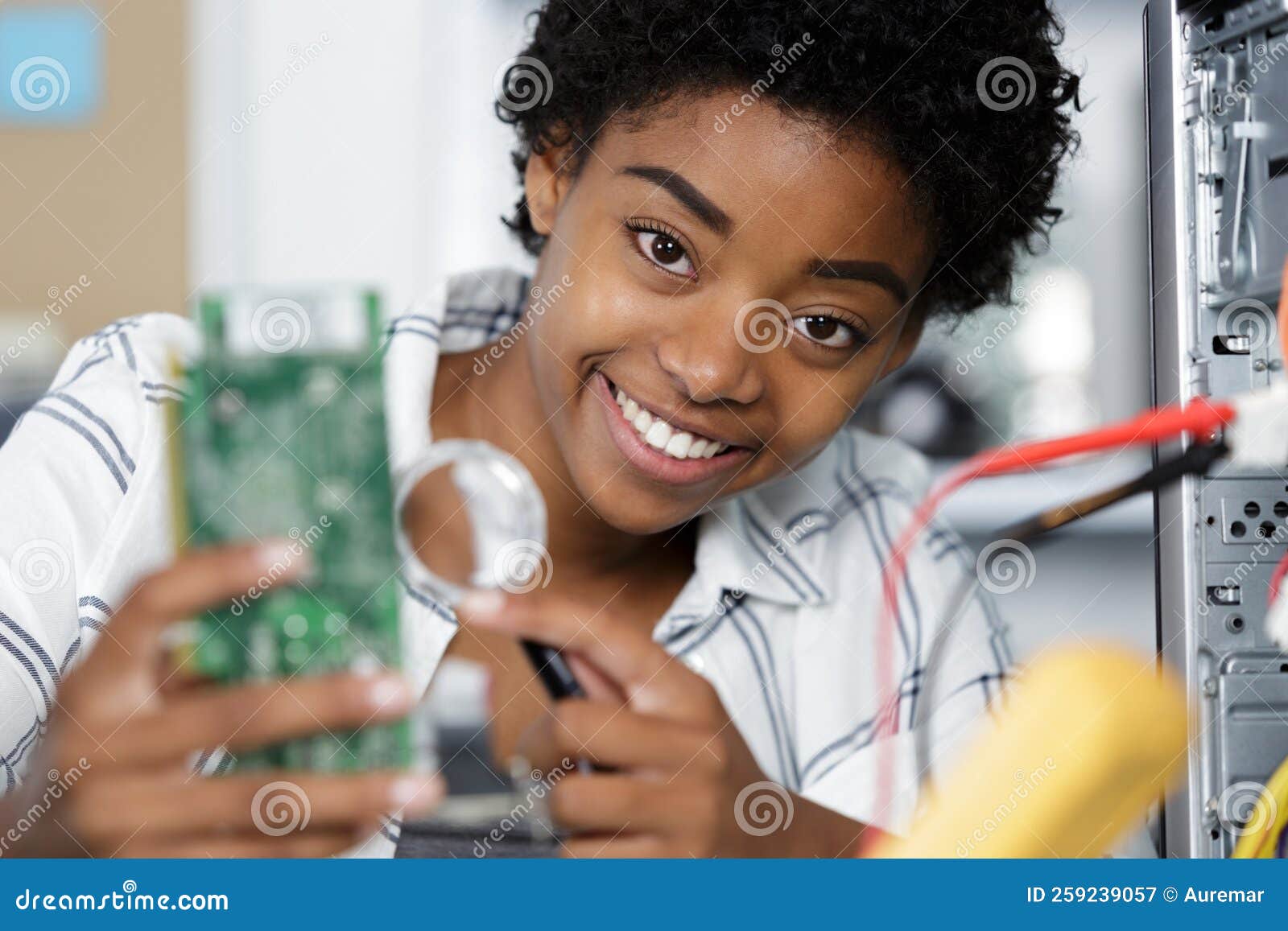 Female Engineer Looking at Circuit with Magnifying Glass Stock Image ...