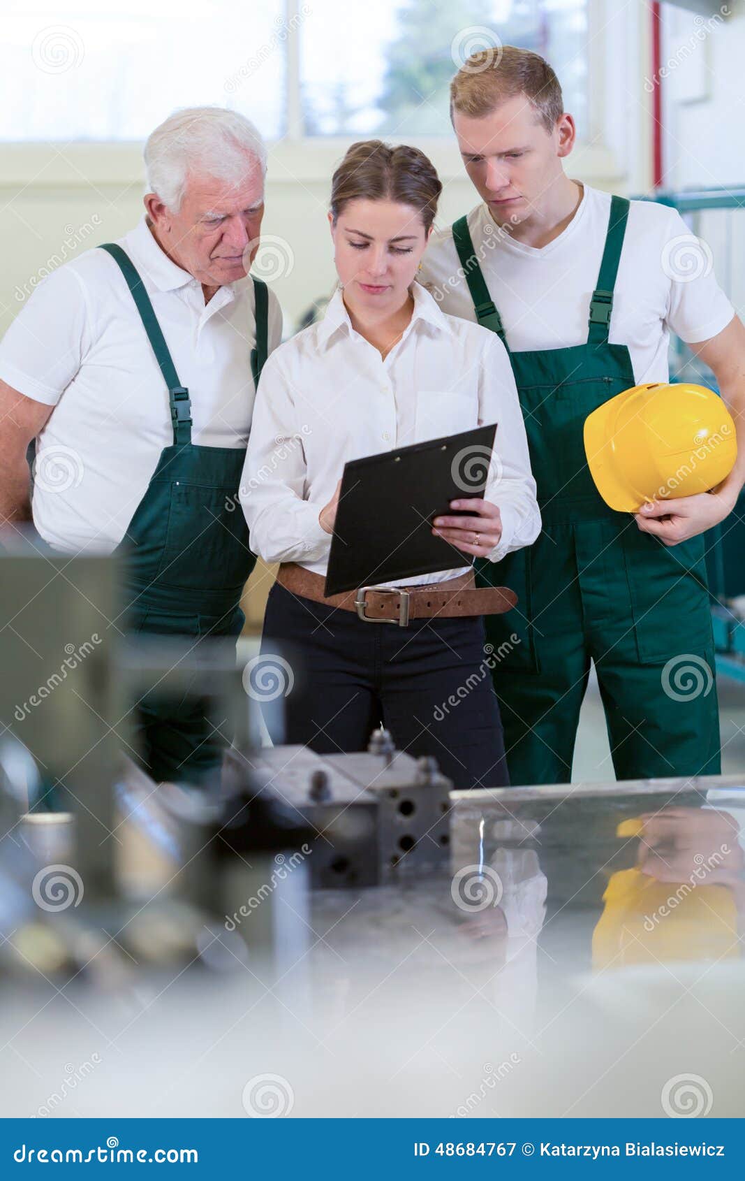 Female Engineer and Manufacturing Labourers Stock Image - Image of ...