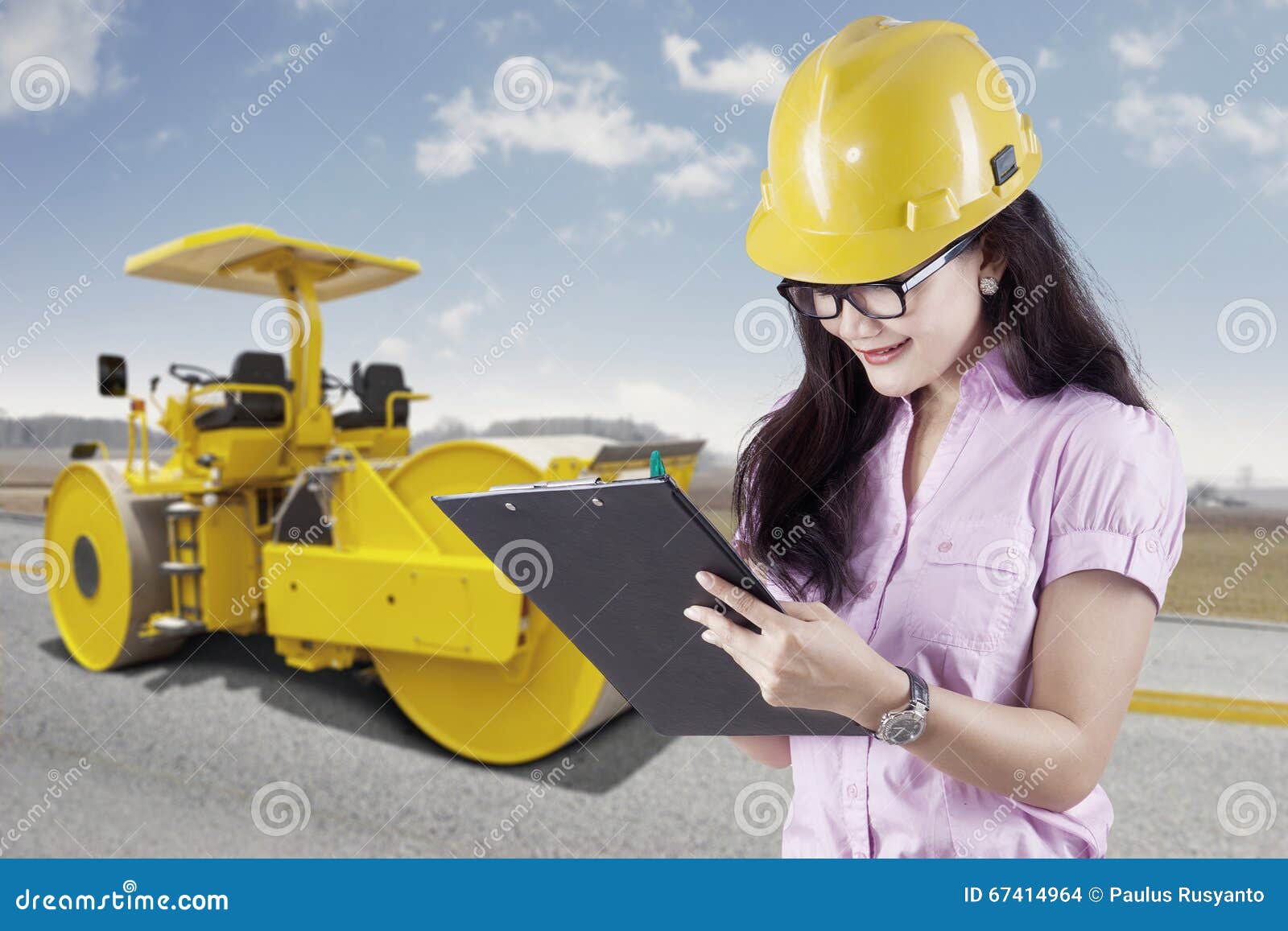 Female Engineer and Road Roller Stock Photo - Image of blacktop ...
