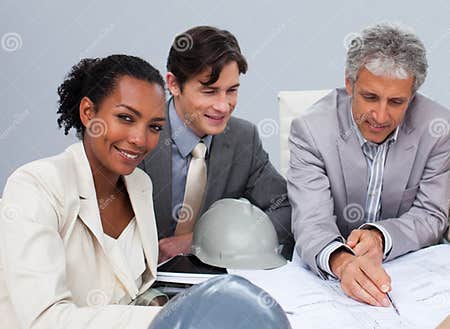 Female Engineer Studying Plans in a Metting Stock Image - Image of ...