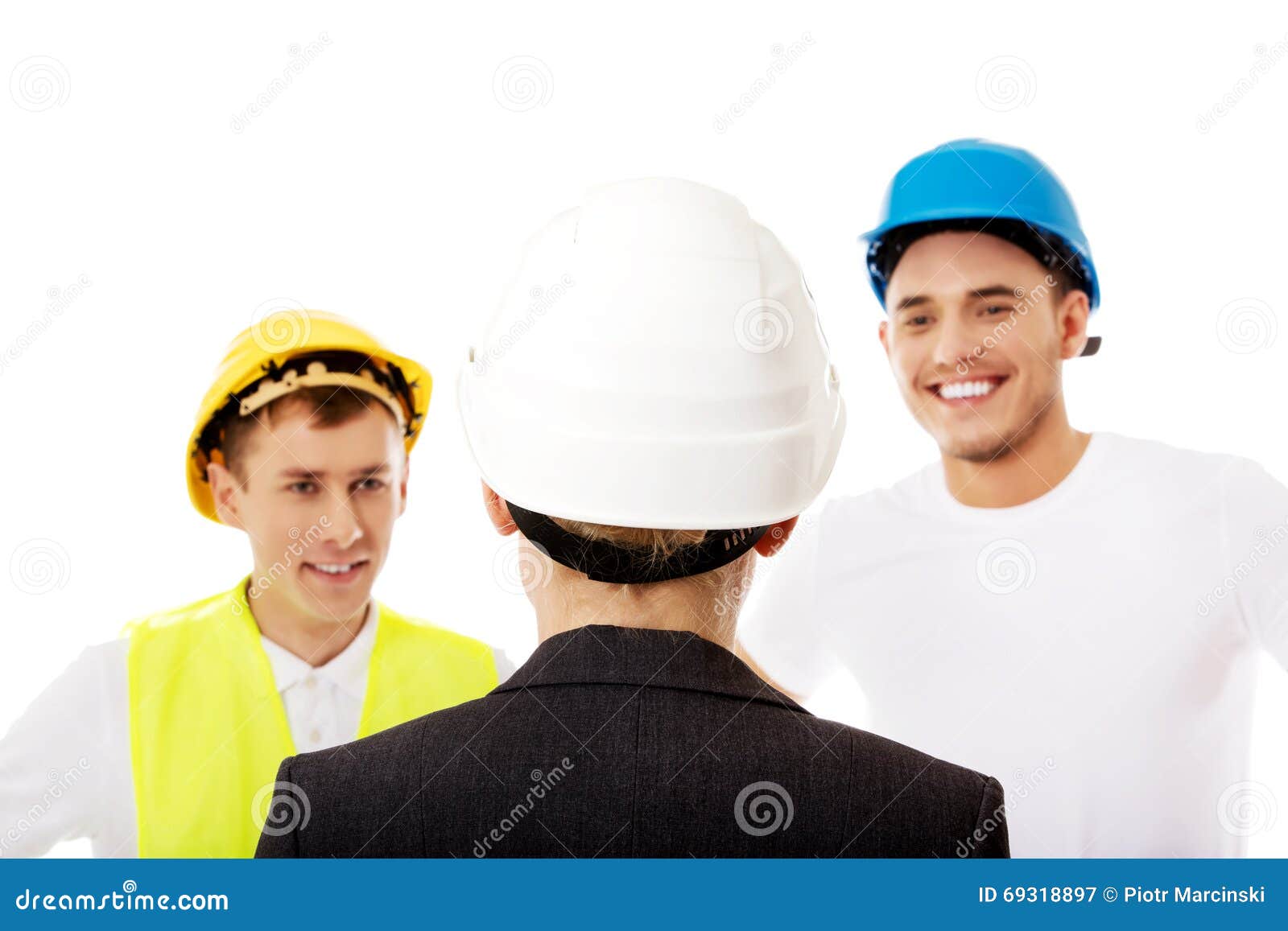 Female Engineer Talking with Two Builders Stock Image - Image of ...