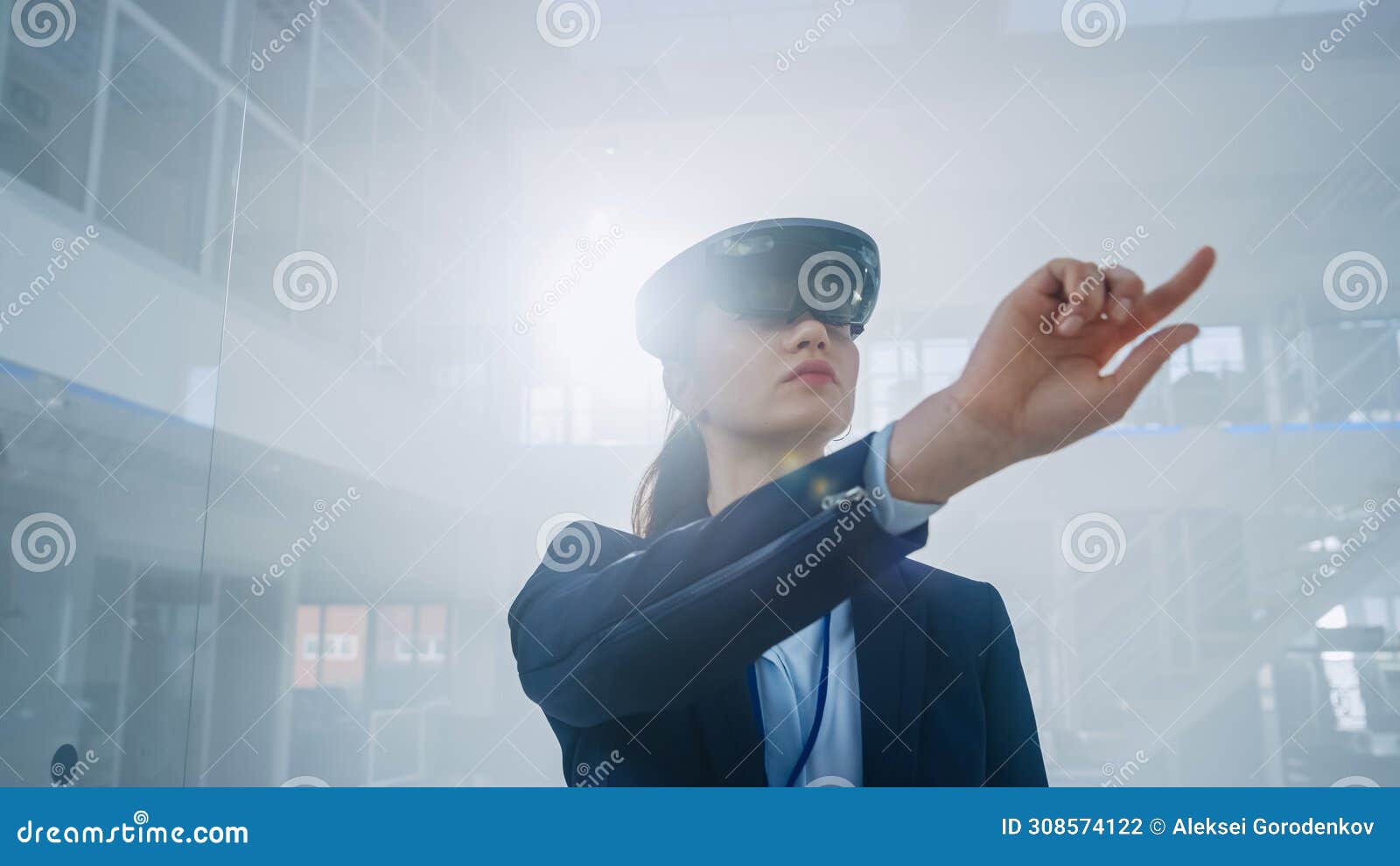Female Engineer Using Augmented Reality Headset Pushes Virtual Buttons ...
