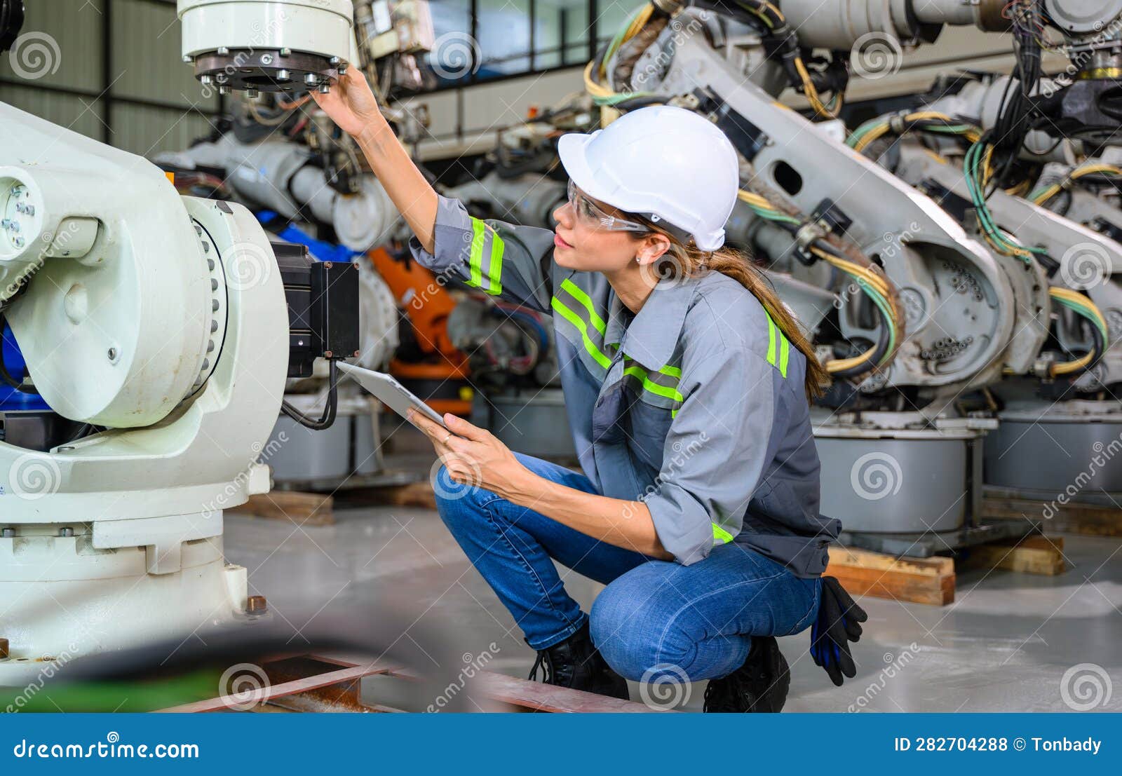 Female Engineer Worker Working with Robotic Machine Automation Stock ...