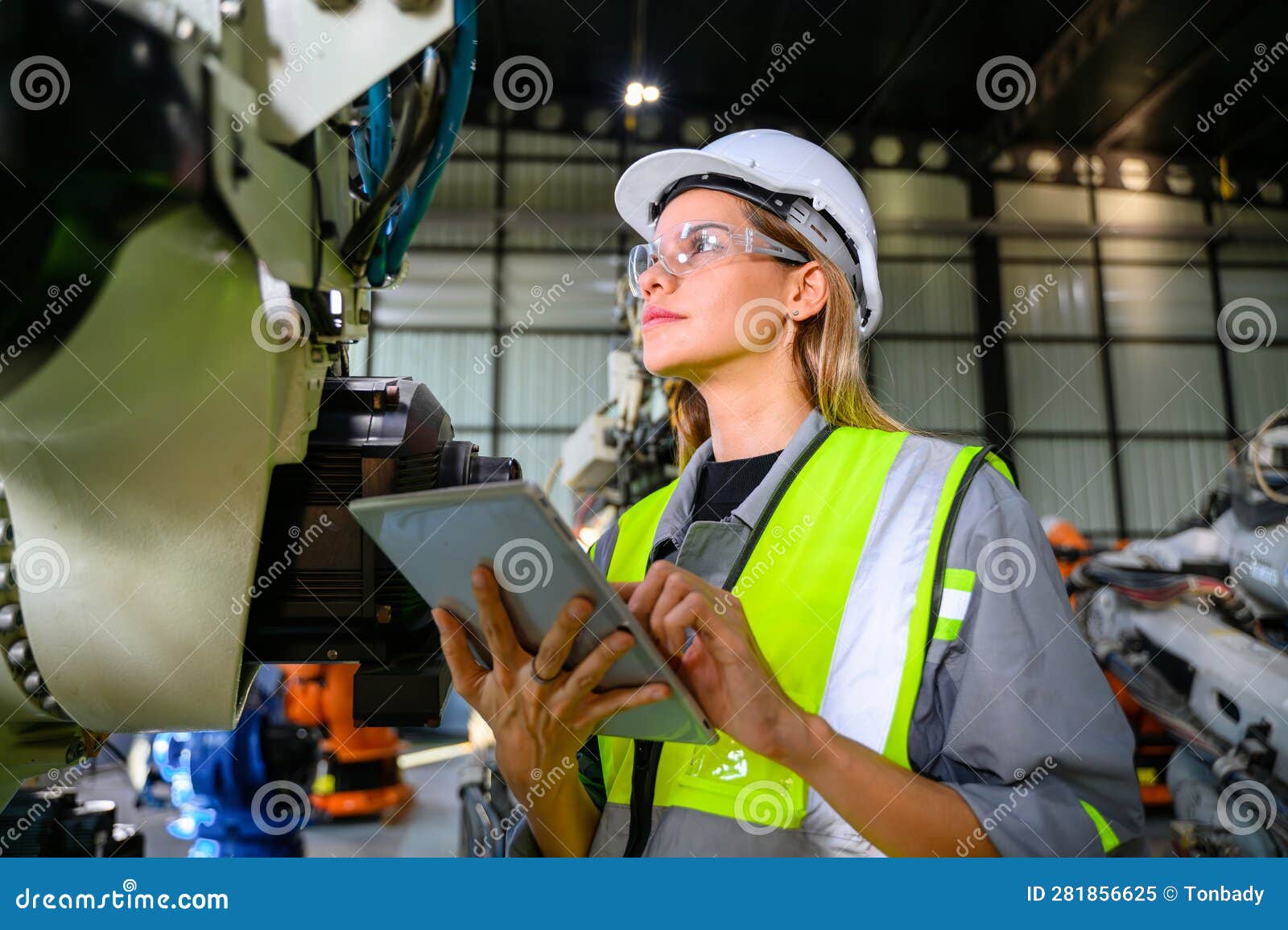 Female Engineer Worker Working with Robotic Machine Automation Stock ...