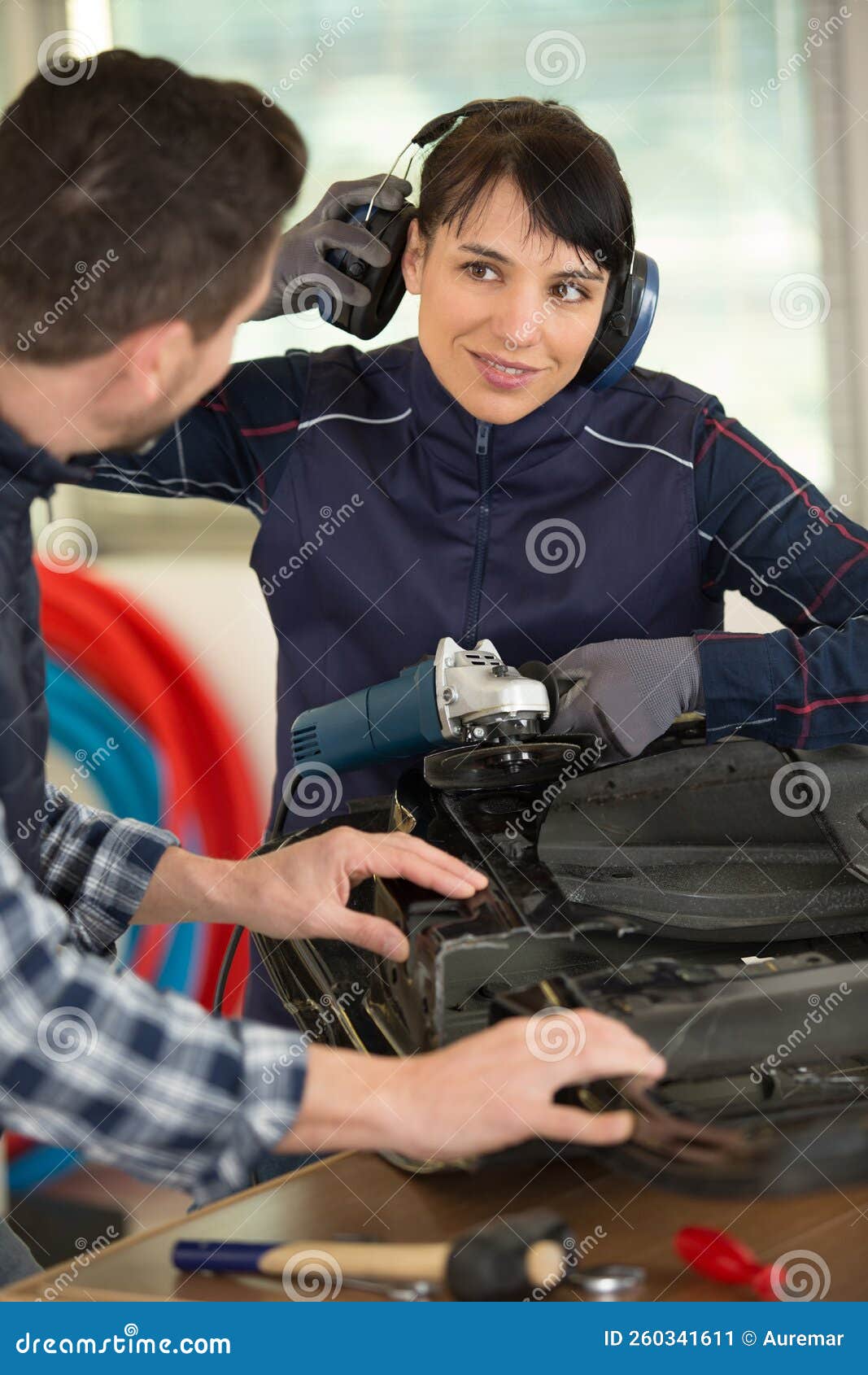 Female Engineer Working on Factor Lifting Protective Ear Muffs Stock ...
