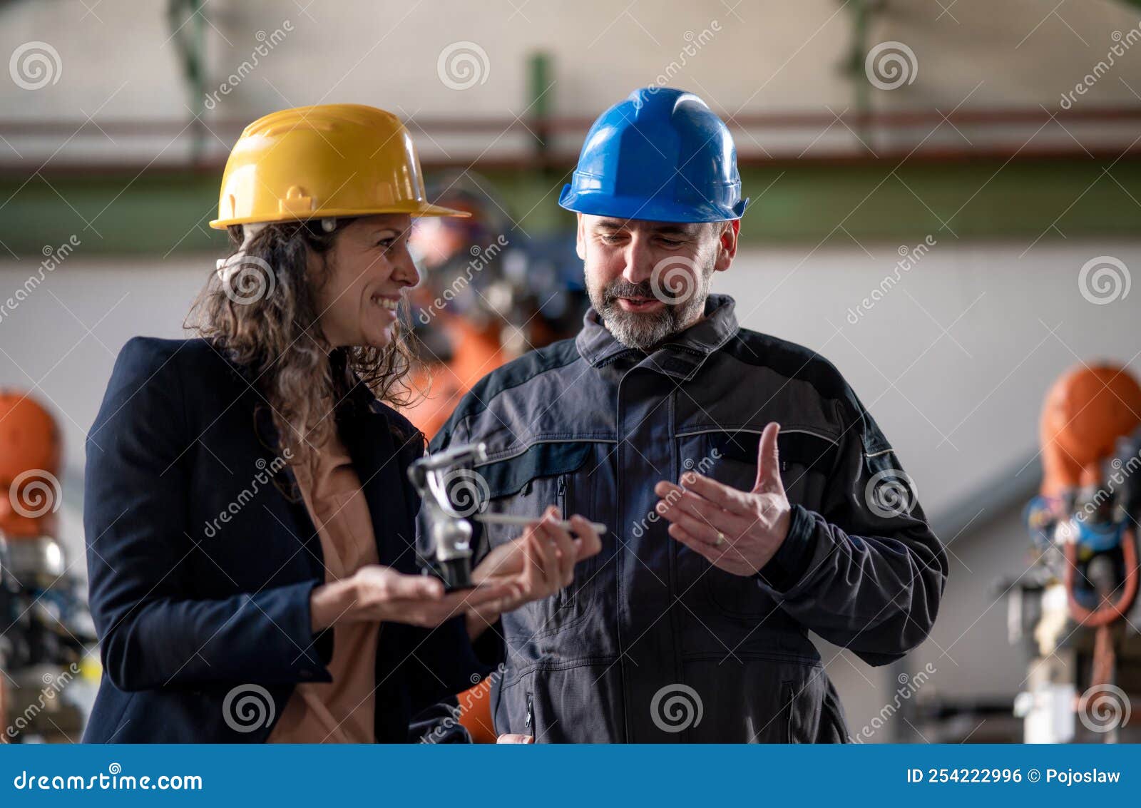 Female Engineering Manager and Mechanic Worker Doing Routine Check Up ...
