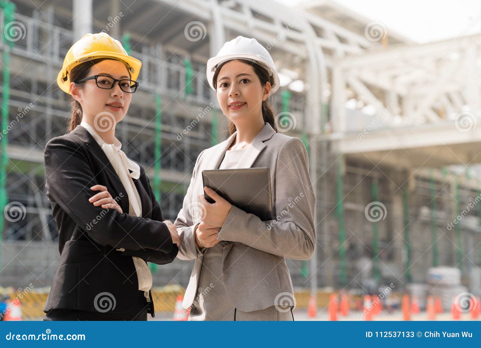 Female Engineers Looking at the Camera. Stock Image - Image of ...