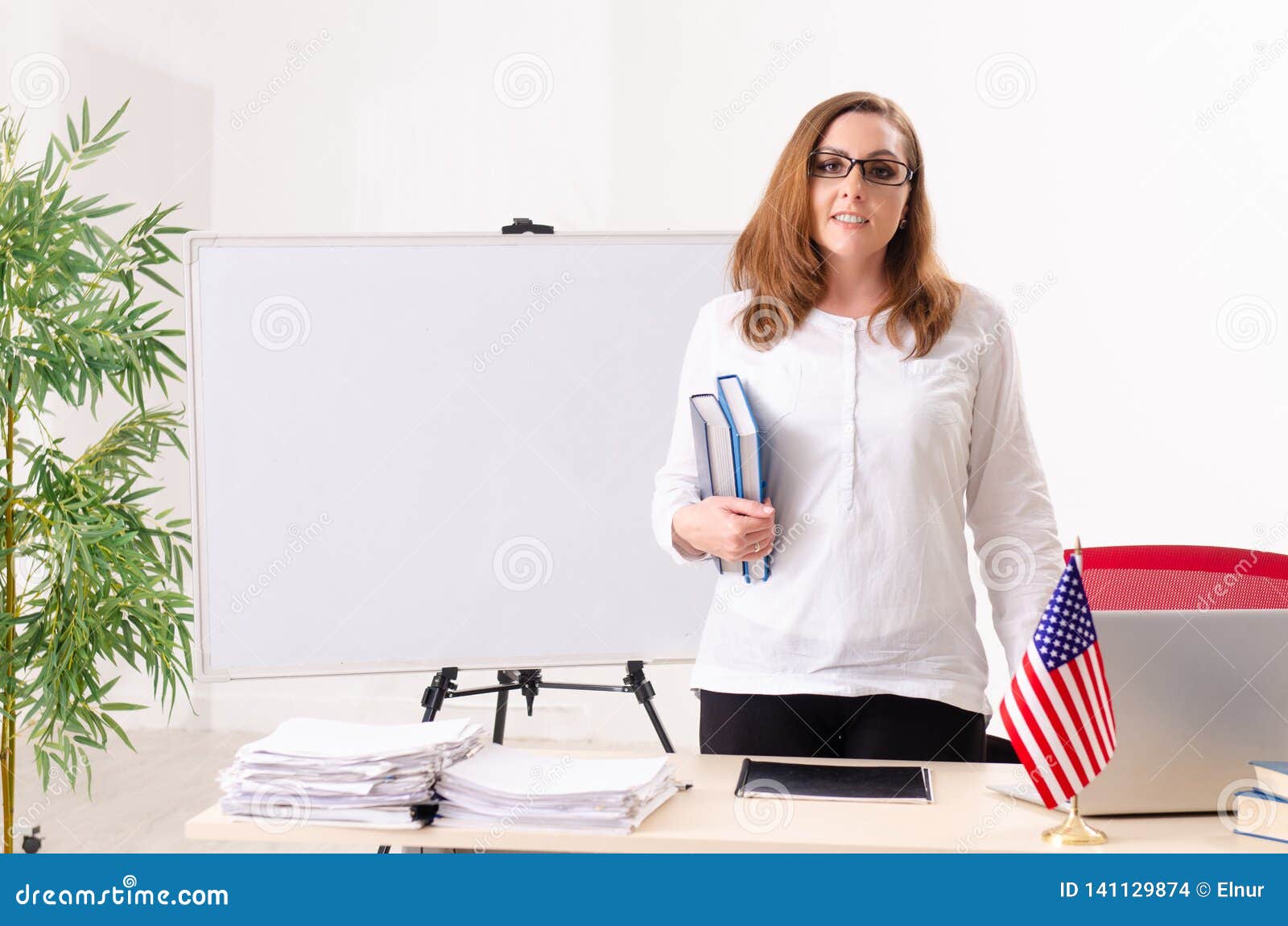The Female English Teacher in the Classroom Stock Photo - Image of ...
