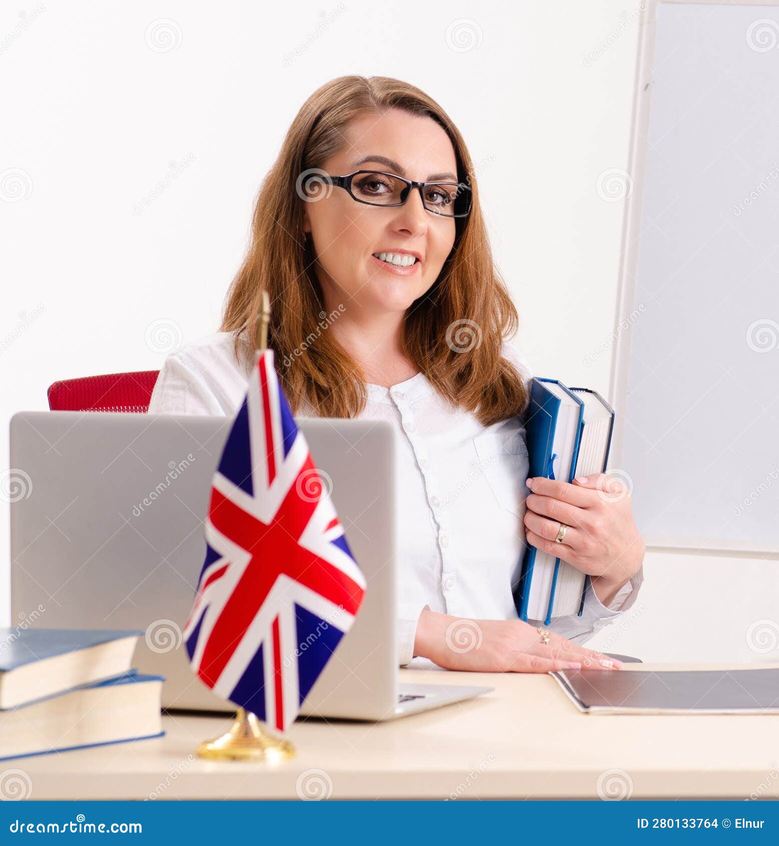 Female English Teacher in the Classroom Stock Photo - Image of ...