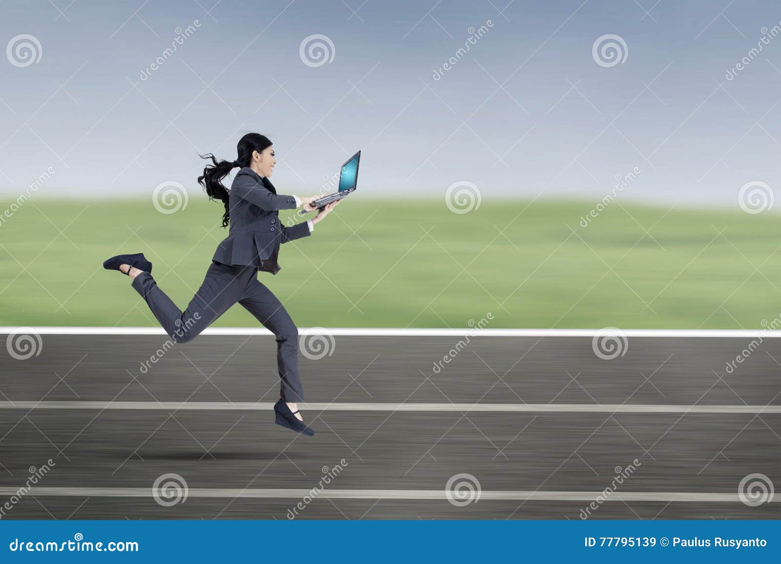 Female Entrepreneur with Laptop Runs on Track Stock Image - Image of ...