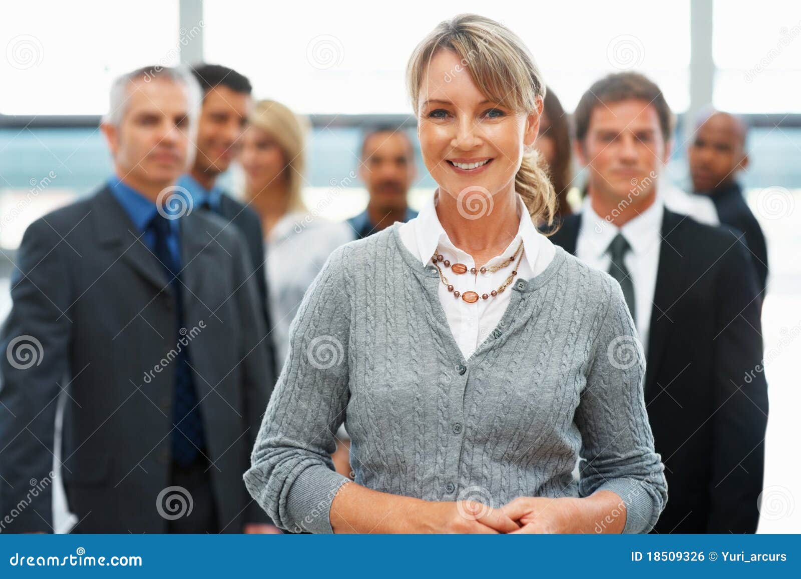 Female Executive in Charge of Team Stock Photo - Image of aged ...