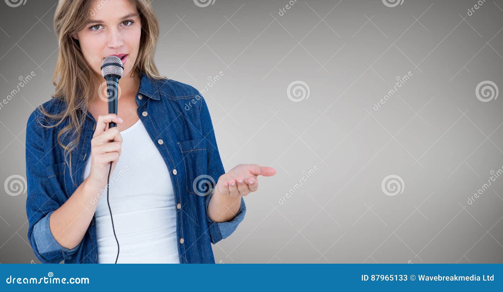 Female Executive Speaking Over Microphone Stock Image - Image of ...