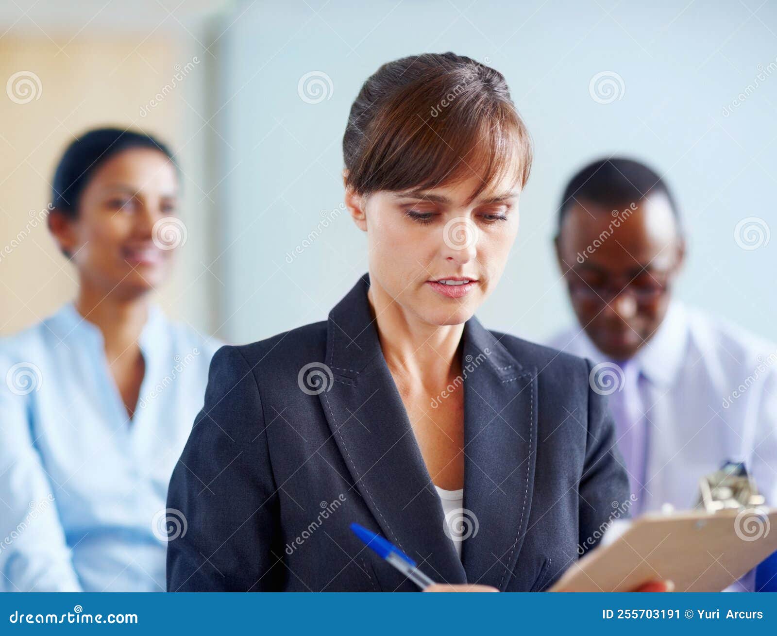 Female Executive Taking Down Notes. View of Female Executive Making ...