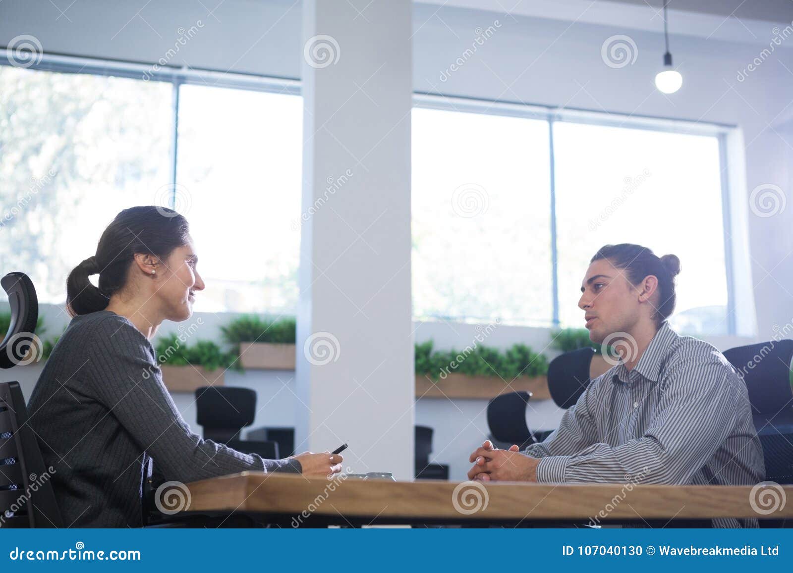 Female Executive Taking Interview of Man Stock Photo - Image of ...