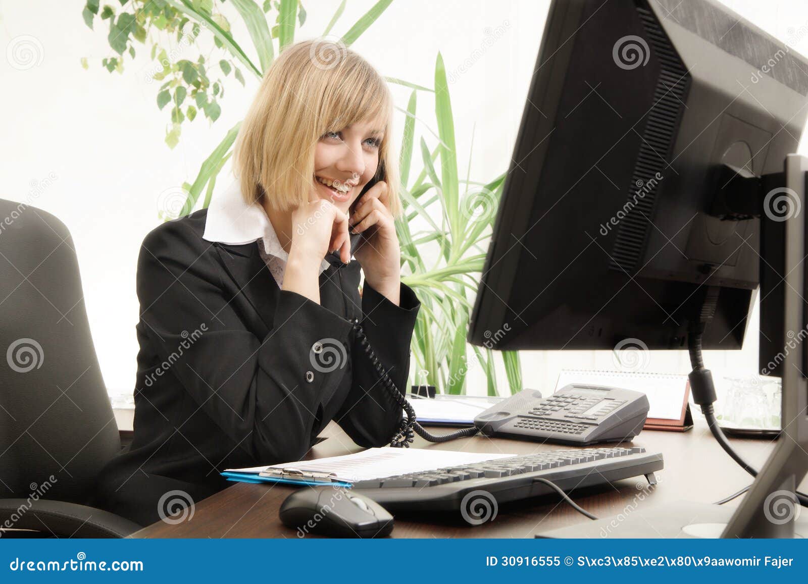 Female Executive Talking on Phone Stock Image - Image of sitting ...