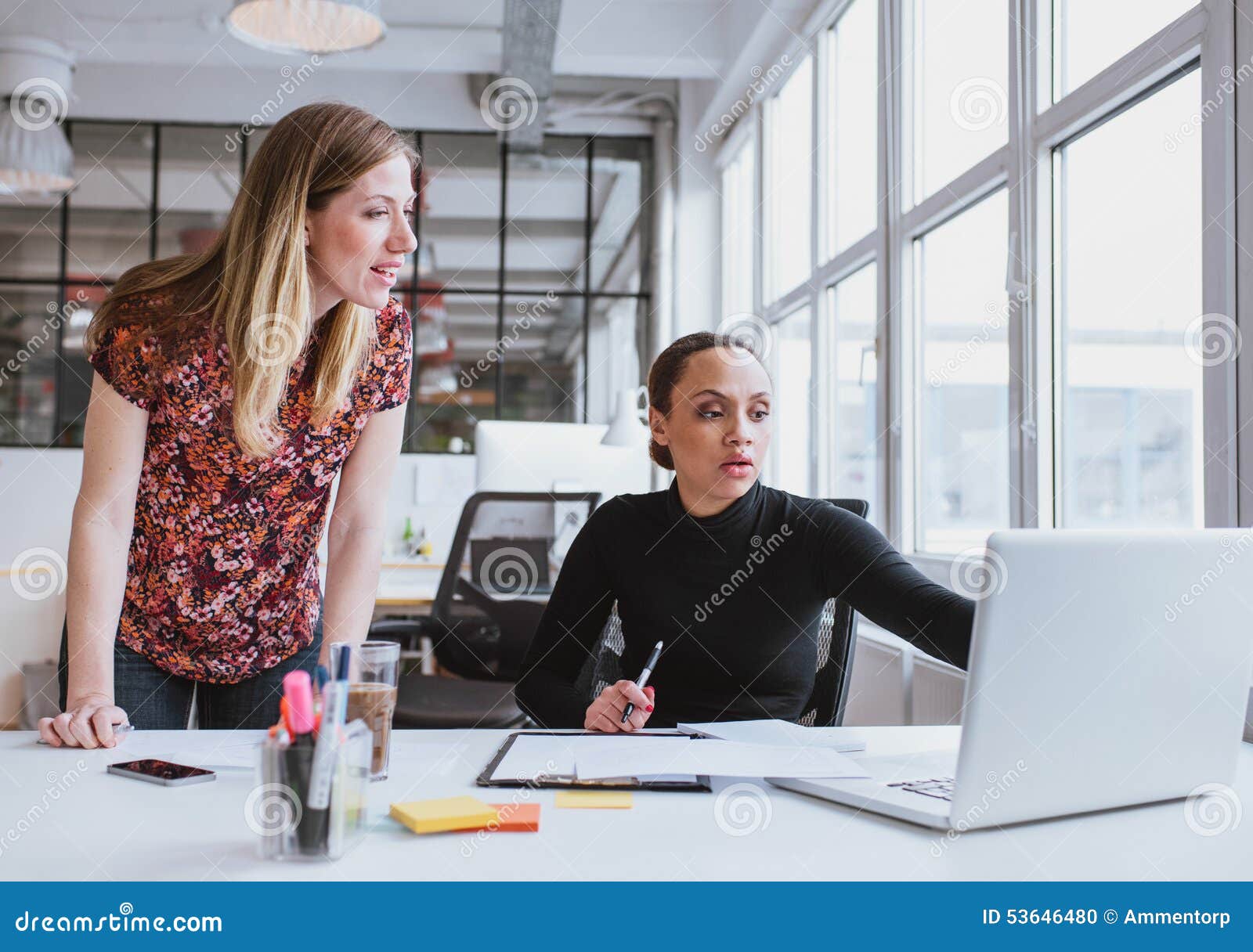 Female Executives Working Together on New Project Stock Photo - Image ...