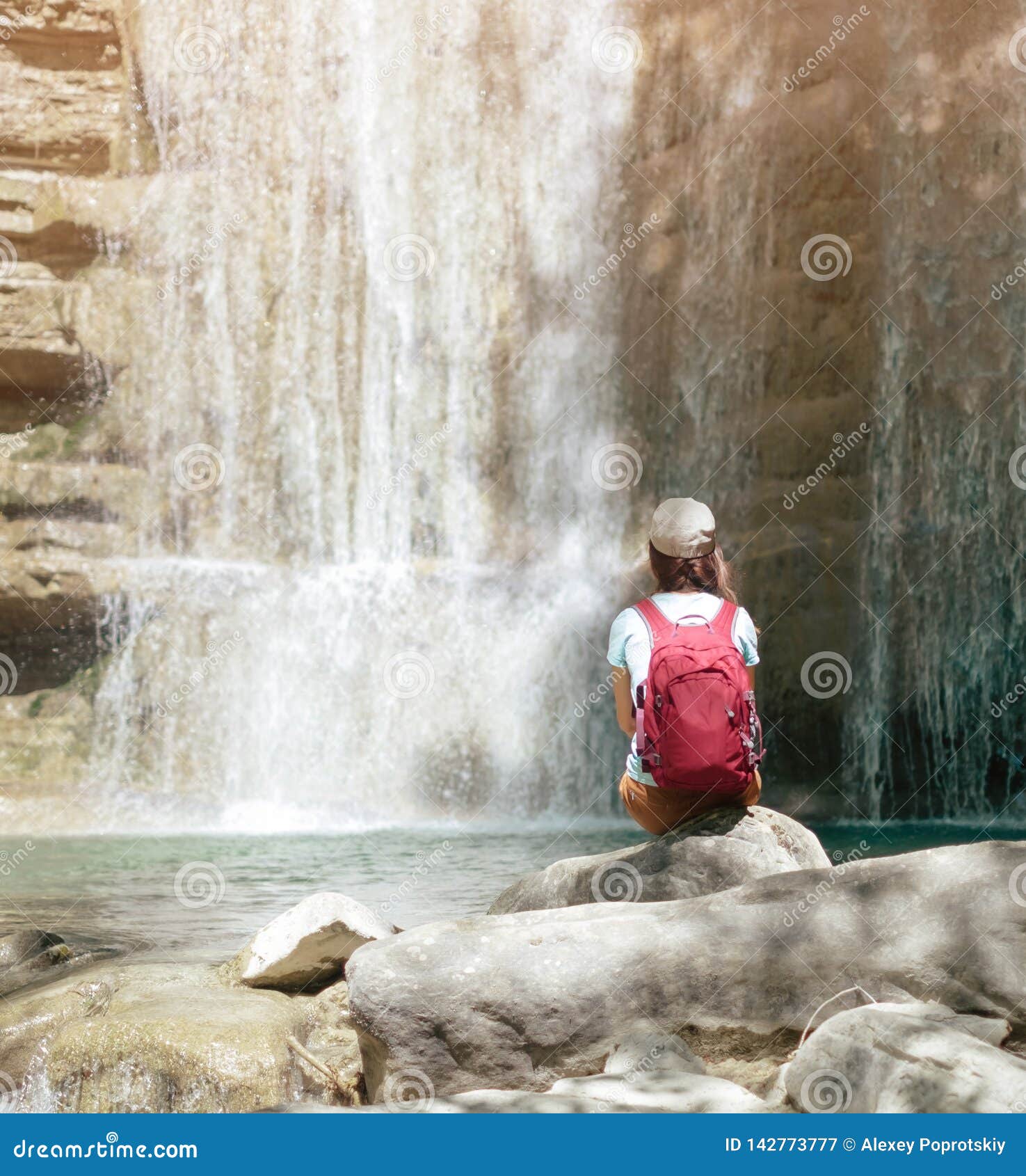 Female Explorer Enjoying View of Waterfall. Stock Image - Image of ...