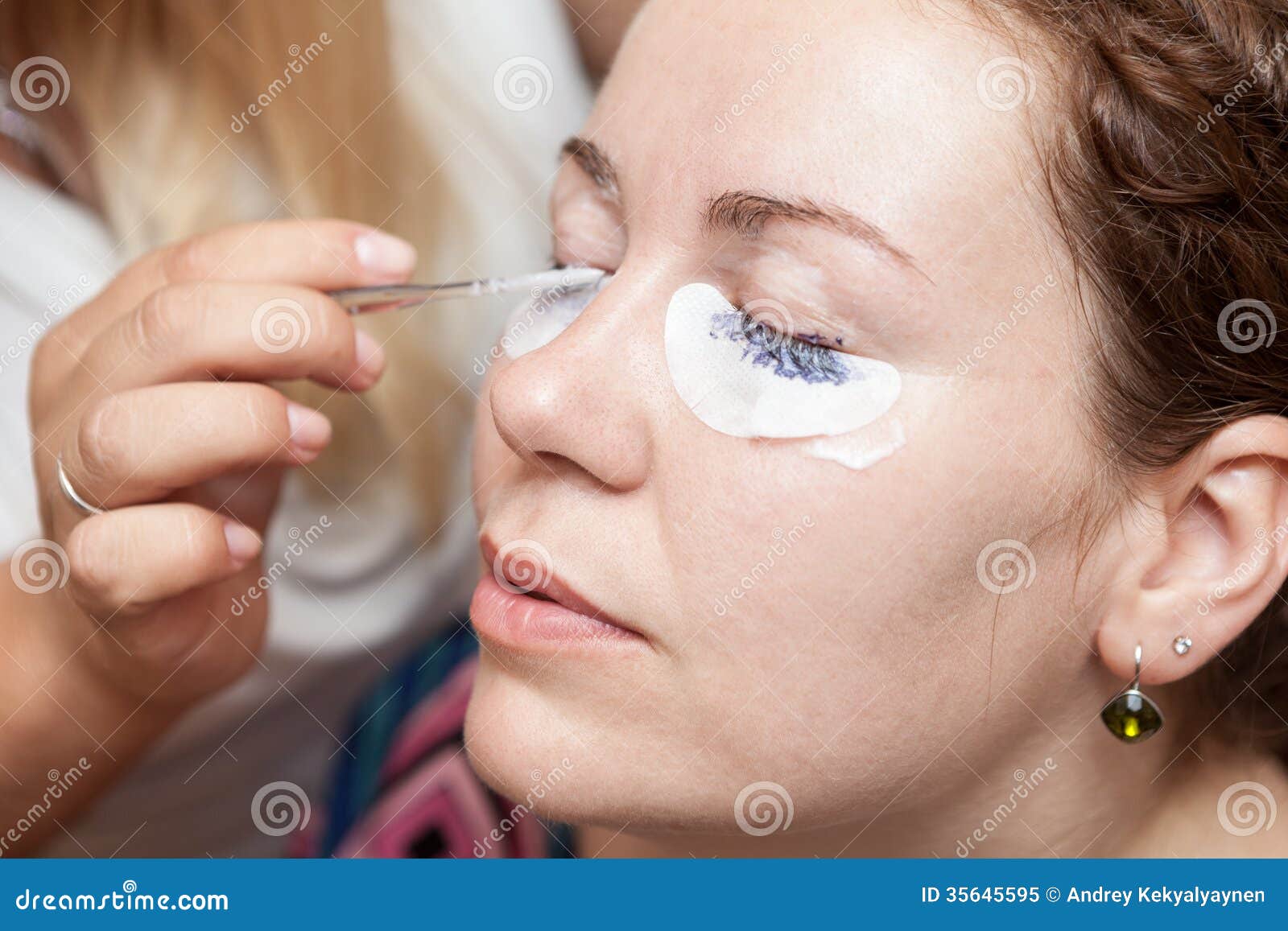 Female Eyelashes Dyeing with Permanent Blue Makeup Stock Image - Image ...