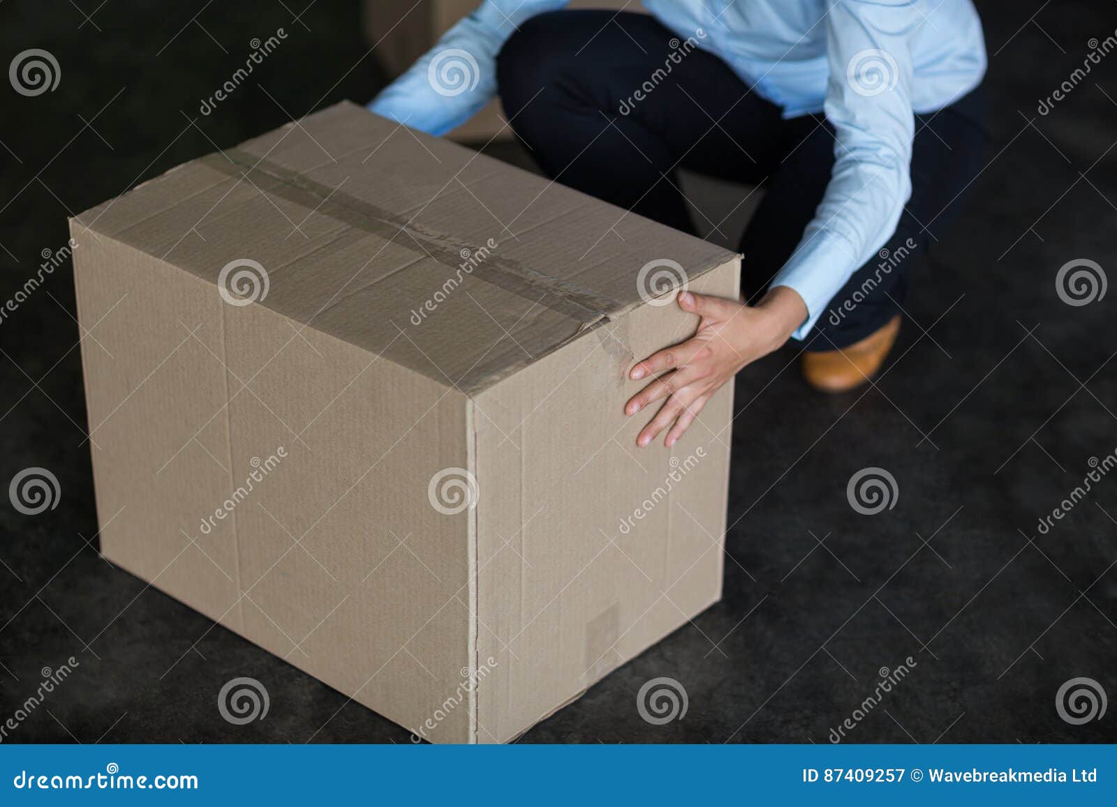 Female Factory Worker Picking Up Cardboard Boxes Stock Image - Image of ...