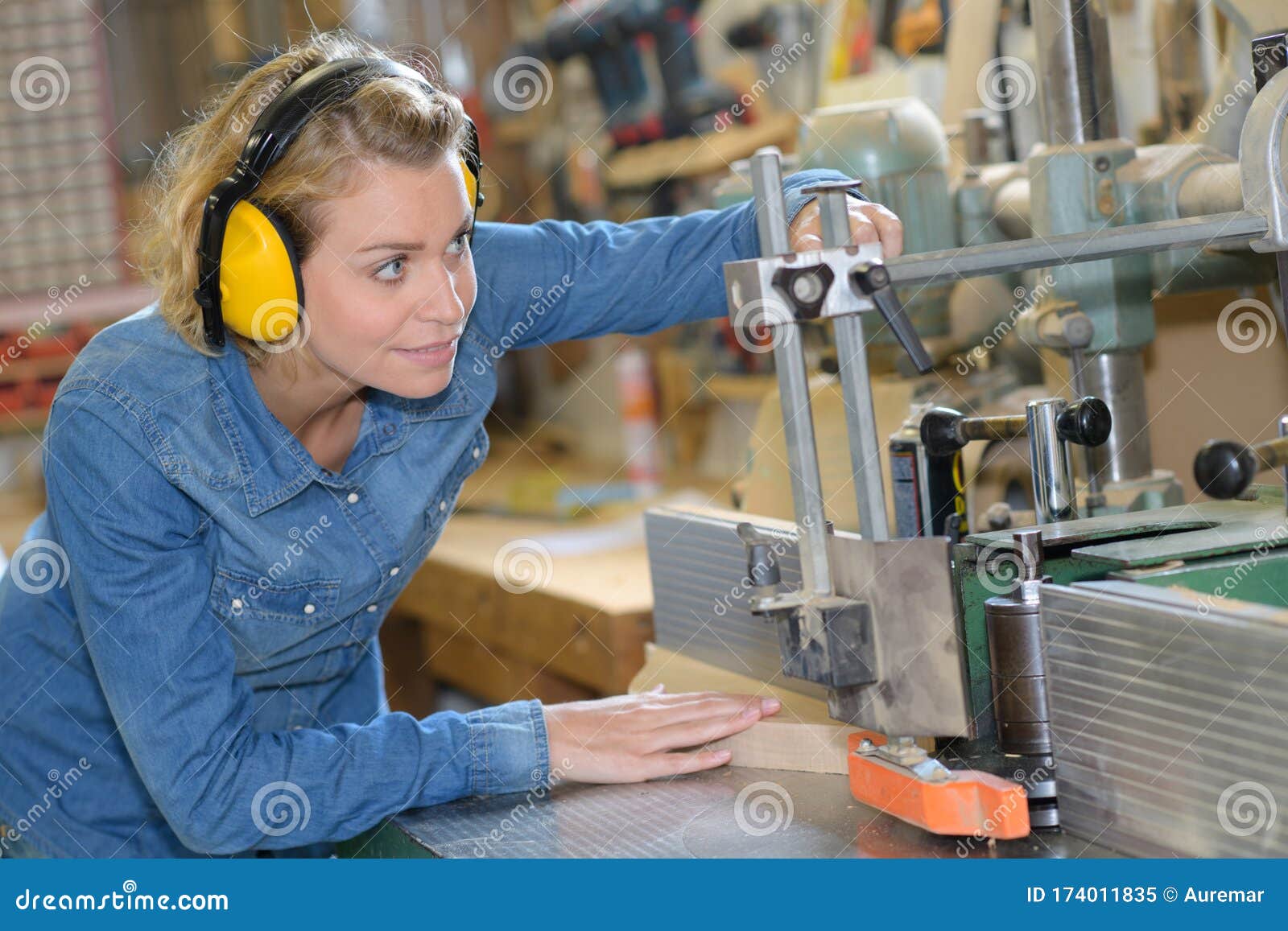 Female Factory Worker Setting Up Machinery Stock Image - Image of ...