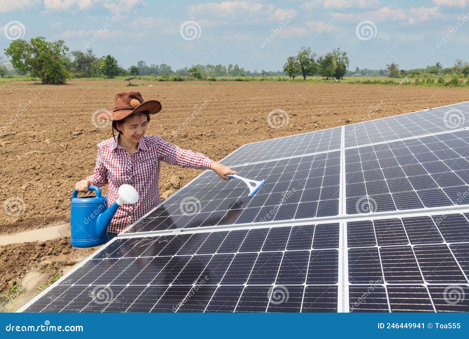 Female Farmer Cleaning Solar Panels in Farm Stock Image - Image of cell ...
